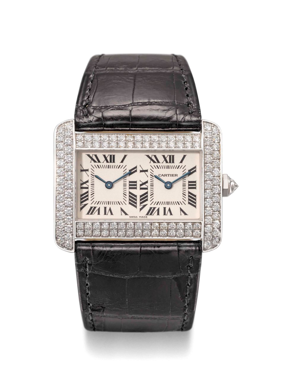 Cartier. A fine and elegant 18K white gold and diamond-set rectangular ...