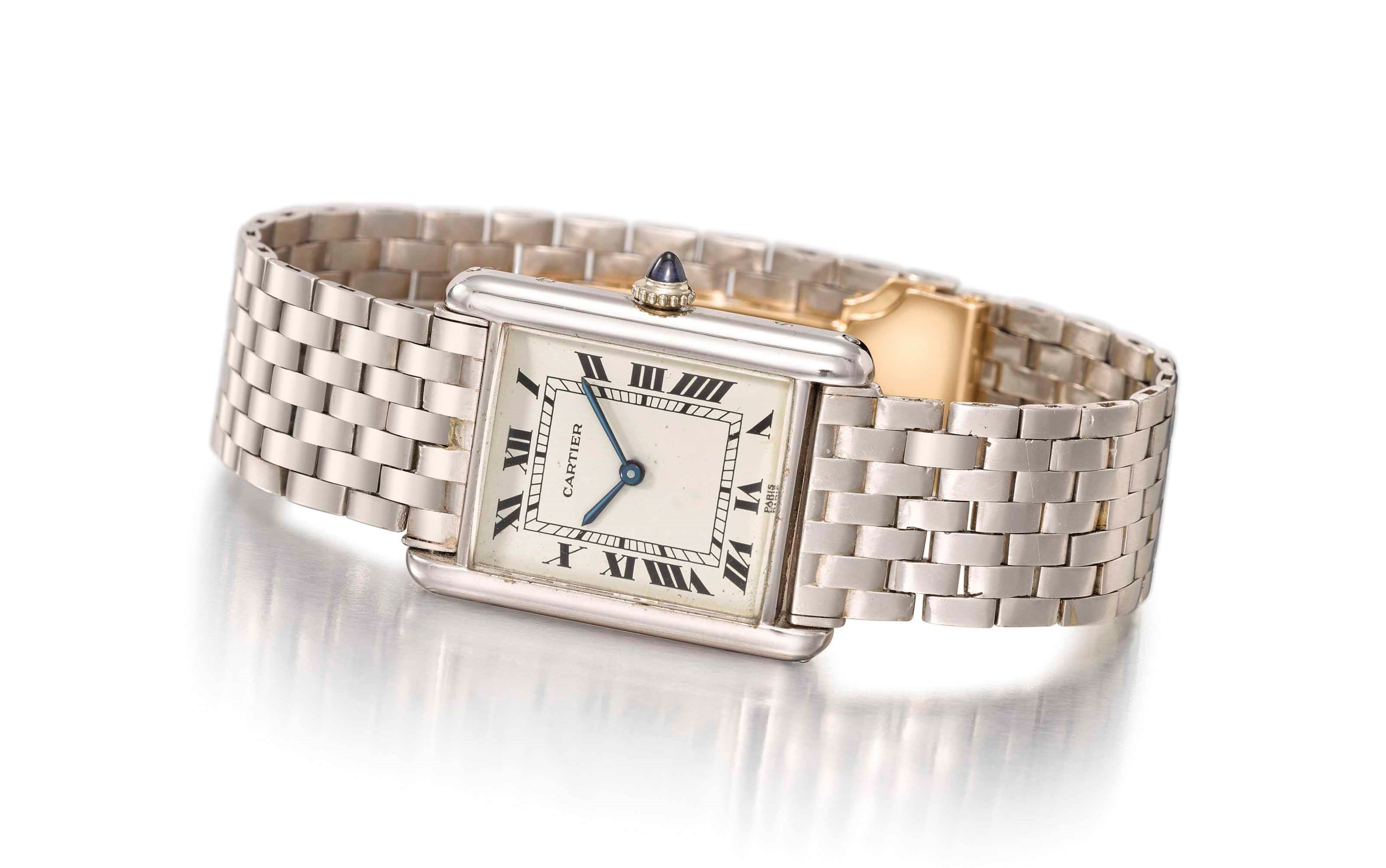 Cartier. A fine and very rare 18K white gold rectangular wristwatch ...