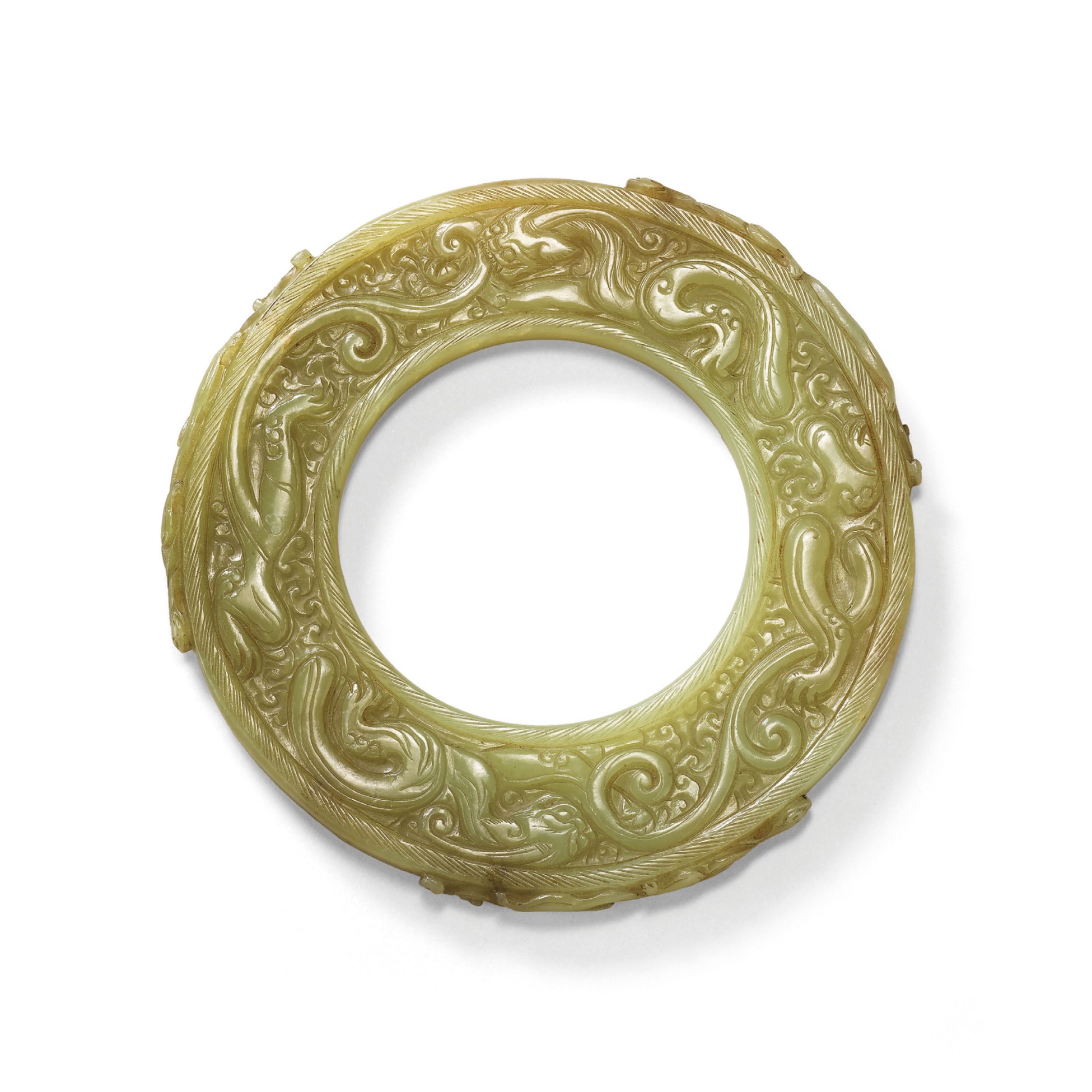 A FINELY CARVED YELLOW JADE ‘CHILONG’ DISC, YUAN, SONG-MING DYNASTY ...