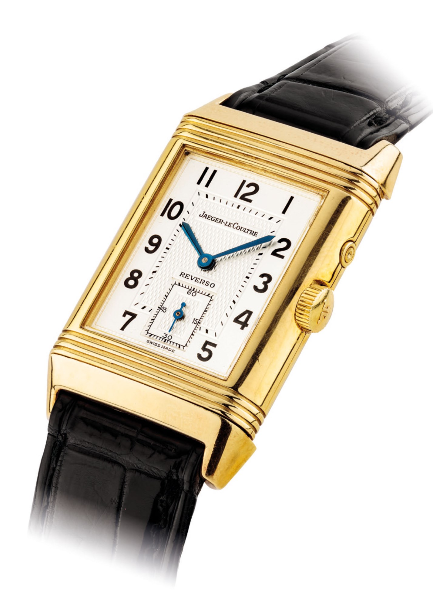 JAEGER LE-COULTRE. AN 18K GOLD REVERSIBLE DOUBLE-DIALED WRISTWATCH WITH ...