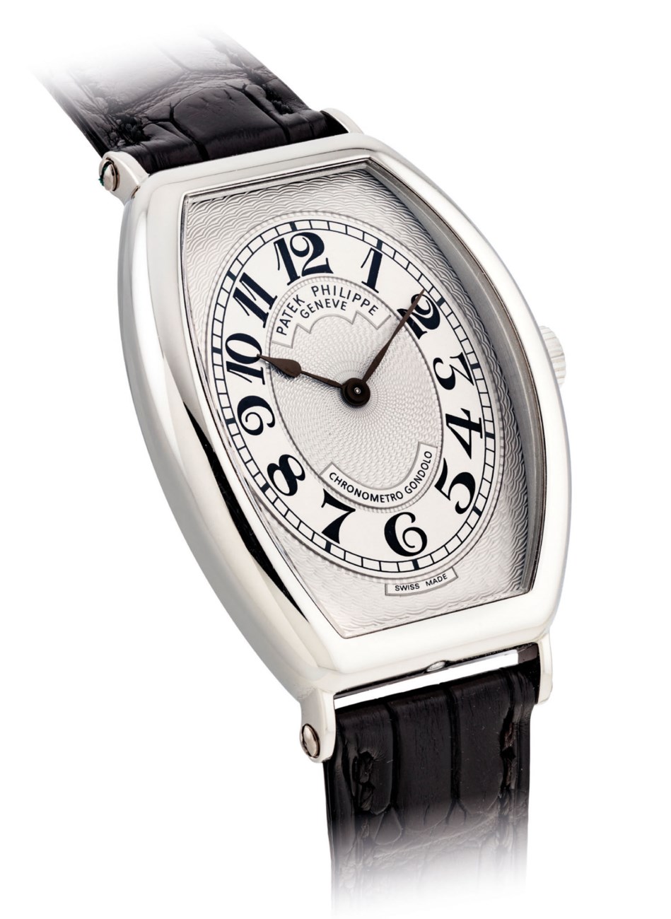 PATEK PHILIPPE. A FINE PLATINUM TONNEAU-SHAPED WRISTWATCH, SIGNED PATEK ...