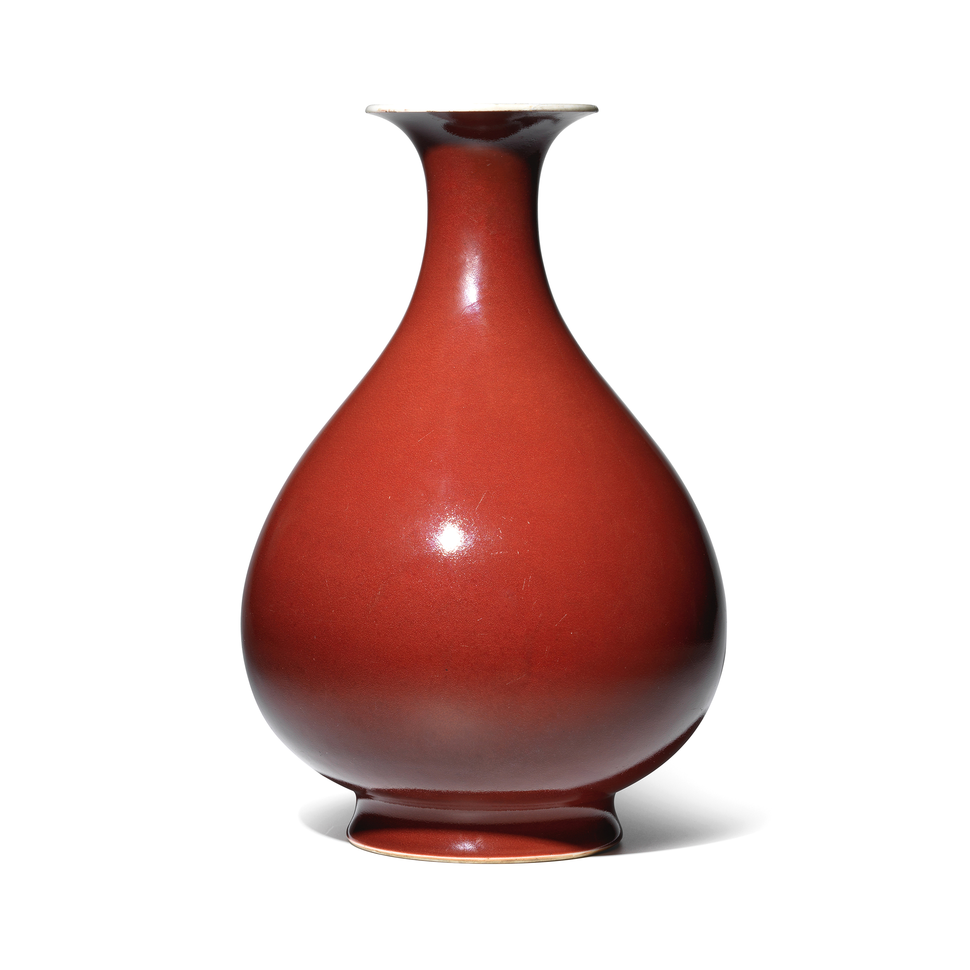 A COPPER-RED GLAZED VASE, YUHUCHUNPING, QIANLONG SIX-CHARACTER SEAL ...