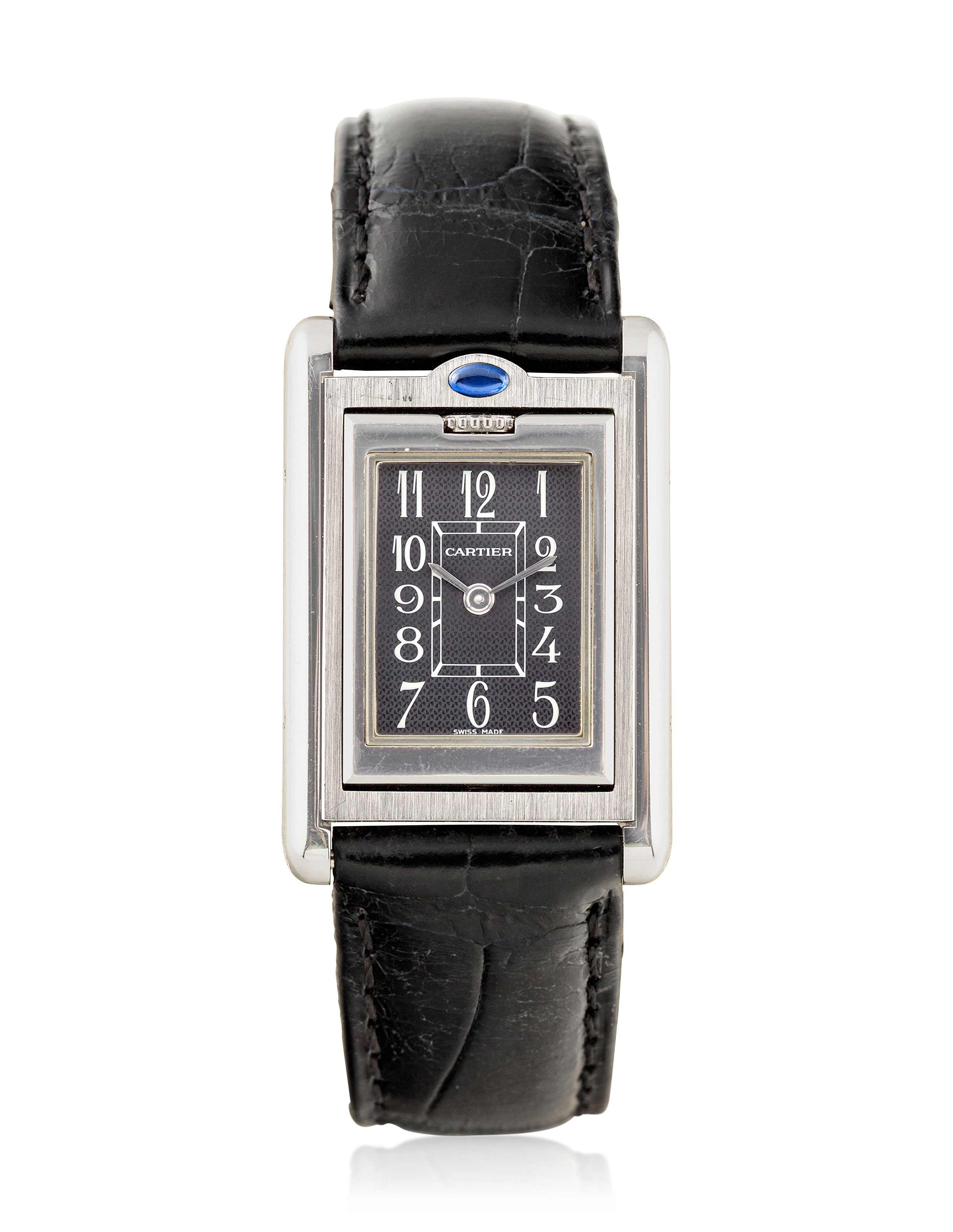 CARTIER, TANK BASCULANTE, | Christie’s