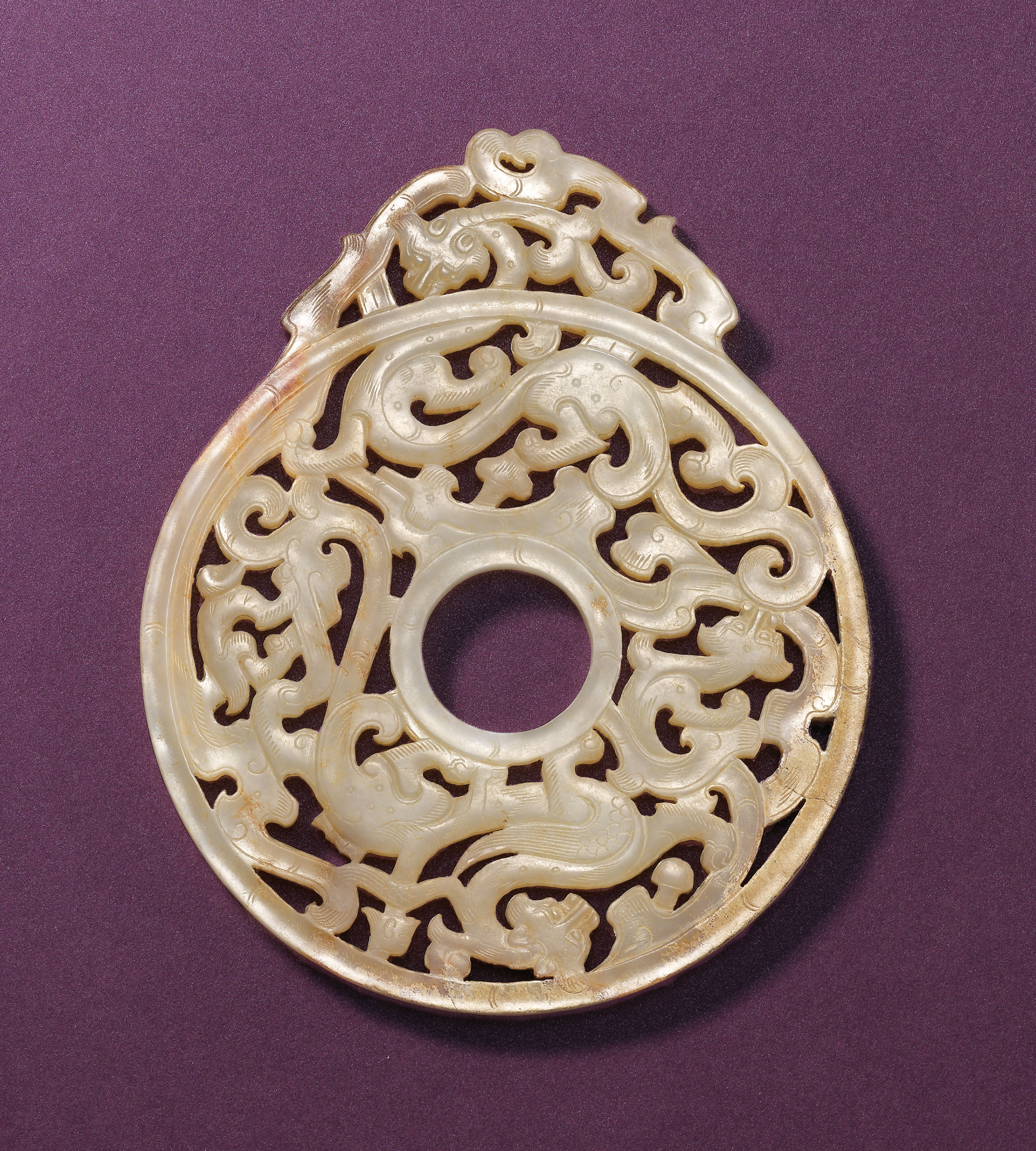 A JADE 'MYTHICAL BEASTS' PLECTRUM-SHAPED PENDANT, SONG DYNASTY (960 ...