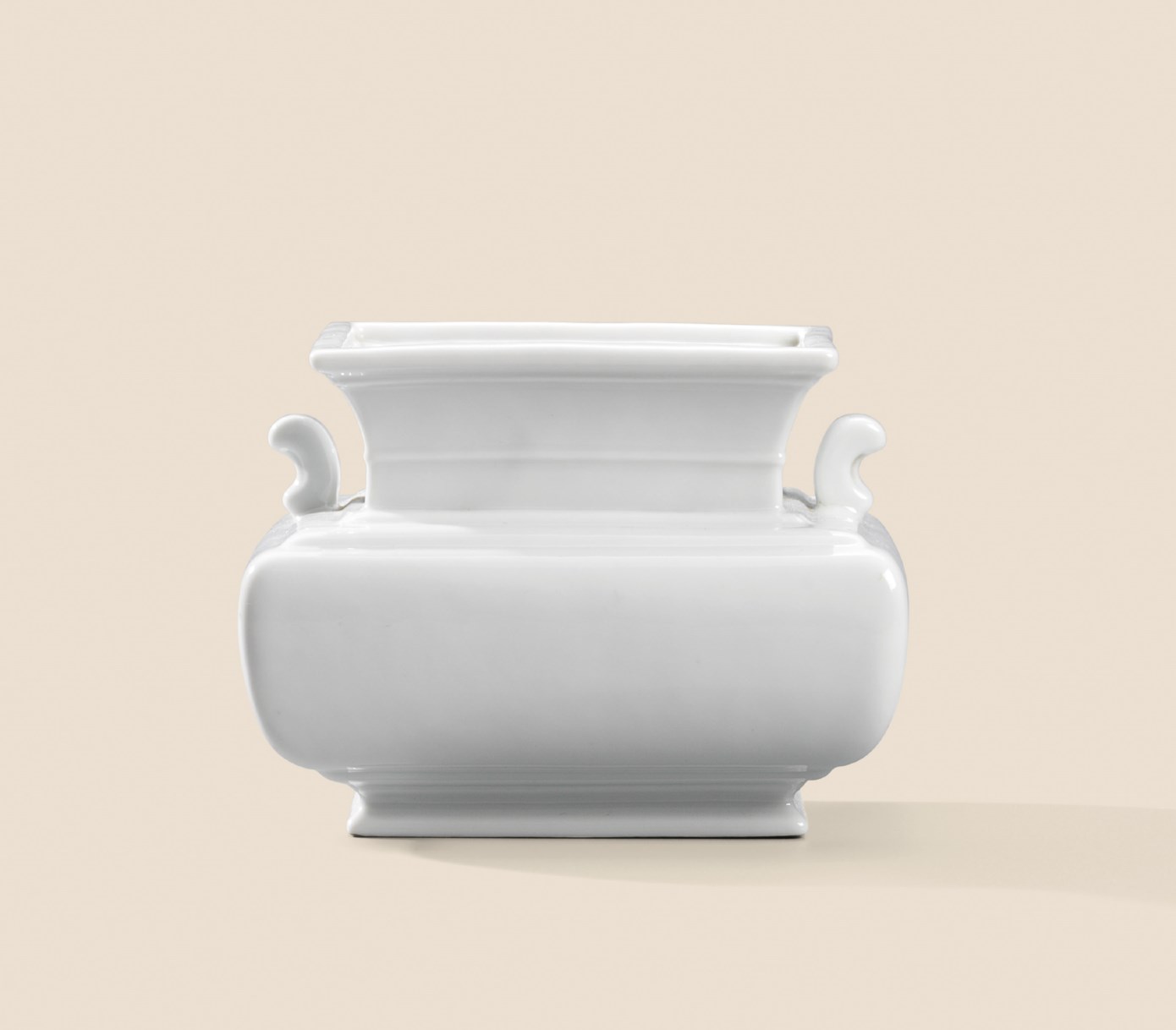 A FINE AND RARE WHITE-GLAZED RECTANGULAR HANDLED VASE, YONGZHENG PERIOD ...