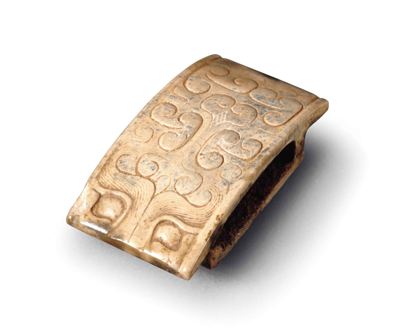 A SMALL ALTERED JADE SWORD SLIDE, LATE EASTERN ZHOU-HAN DYNASTY, 3RD ...