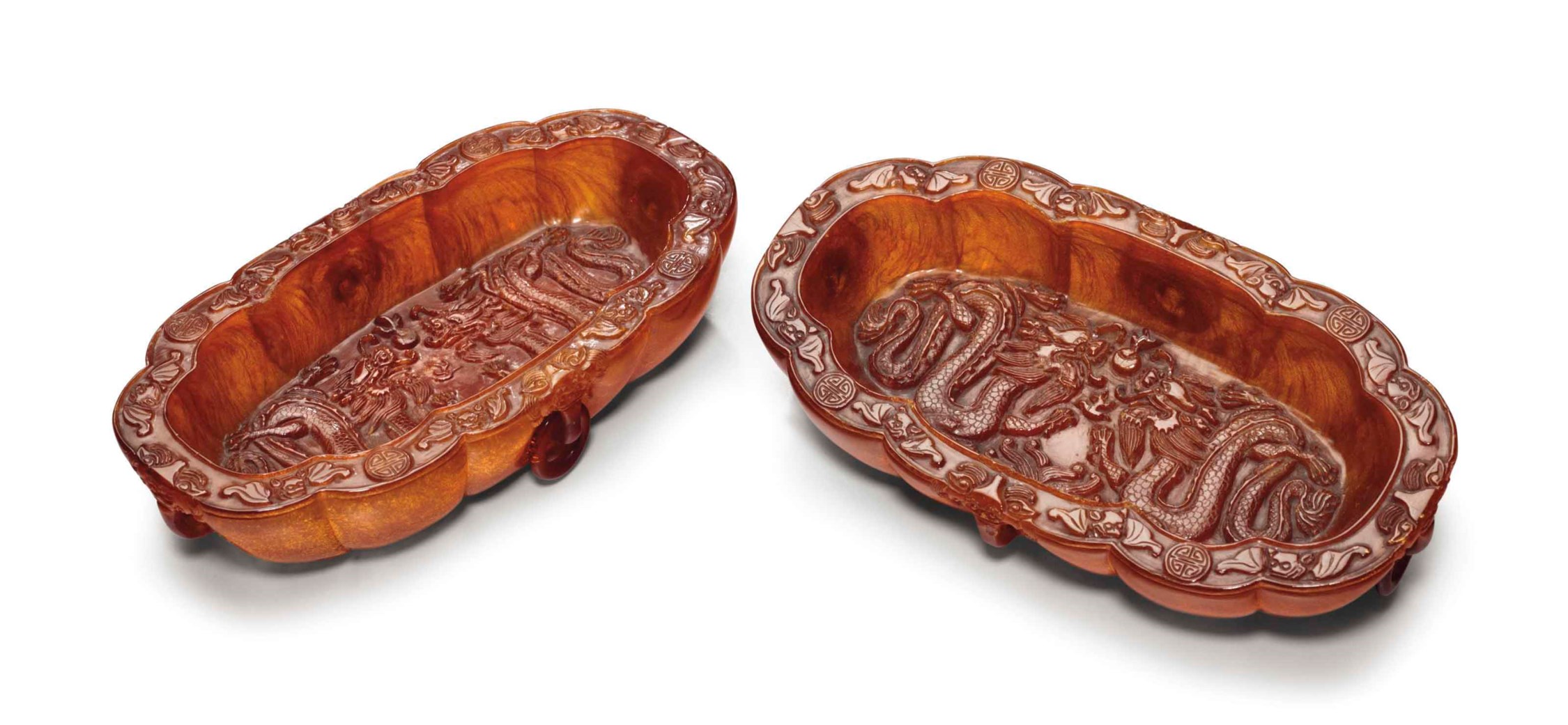 A PAIR OF AMBER OBLONG BRUSH WASHERS