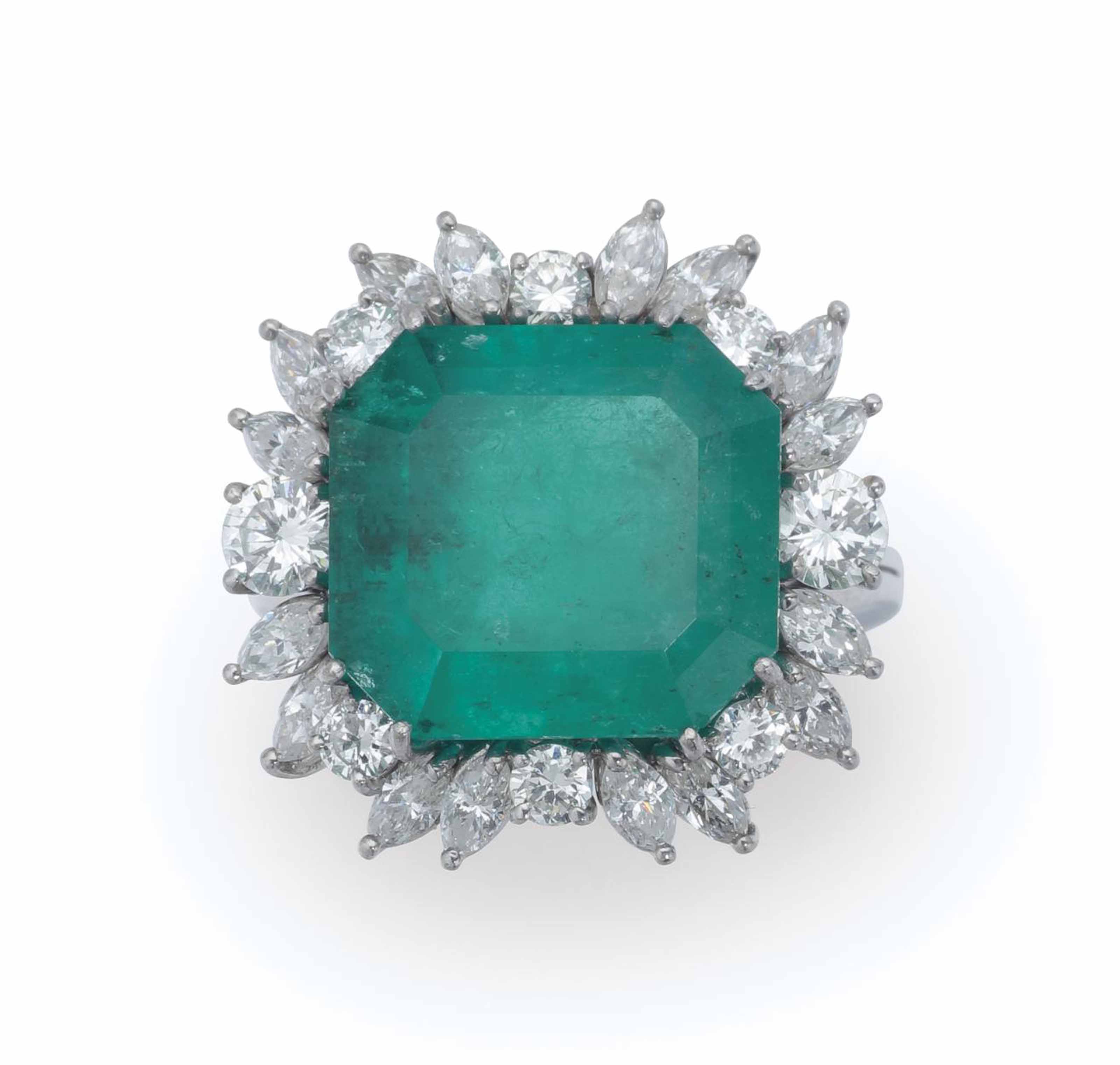 A RECTANGULAR CUT EMERALD AND DIAMOND RING | Christie's