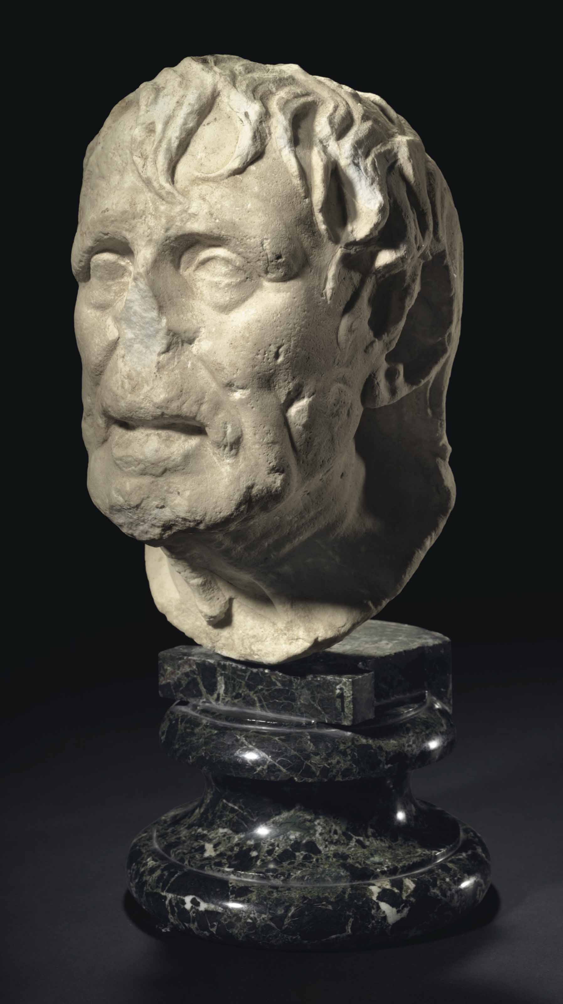 A ROMAN MARBLE PORTRAIT BUST OF 