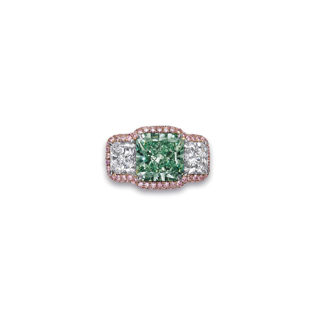 A RARE COLORED DIAMOND AND DIAMOND RING | Christie's