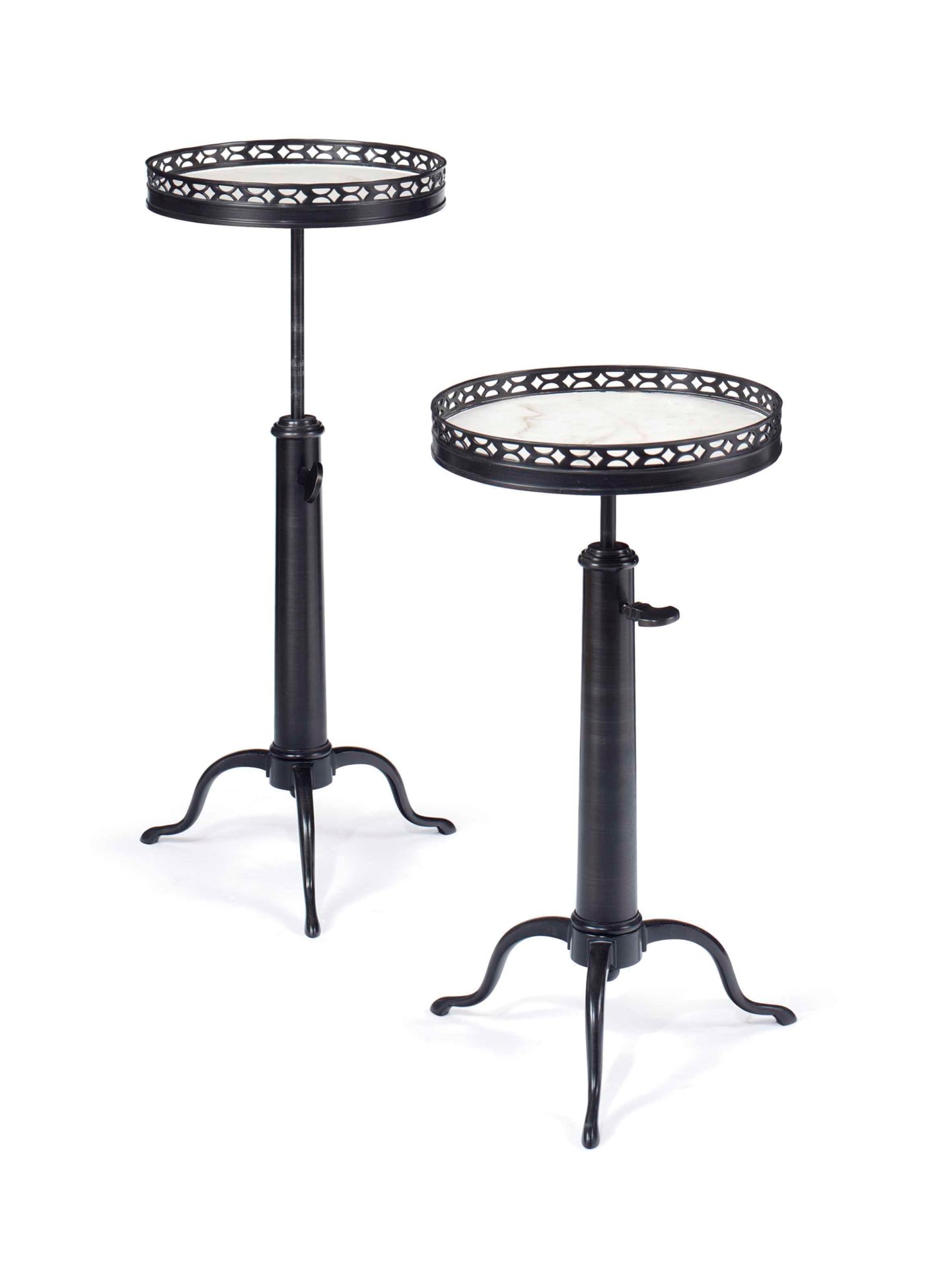 A PAIR OF FRENCH BRUSHED METAL TELESCOPING TABLES, SUPPLIED BY MAISON ...