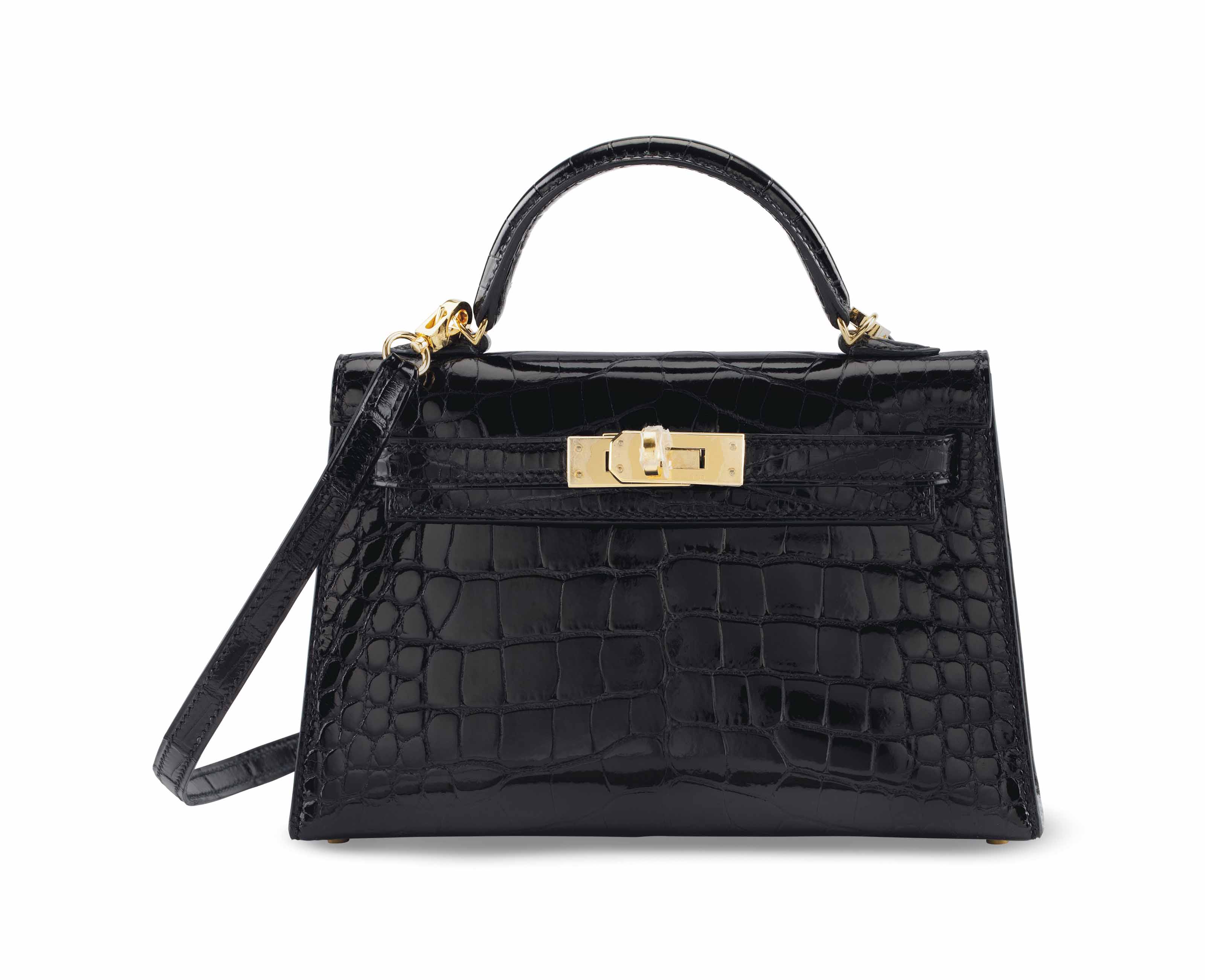 A SHINY BLACK ALLIGATOR SELLIER MINI KELLY 20 II WITH GOLD HARDWARE A SHINY BLACK ALLIGATOR SELLIER MINI KELLY 20 II WITH GOLD HARDWARE