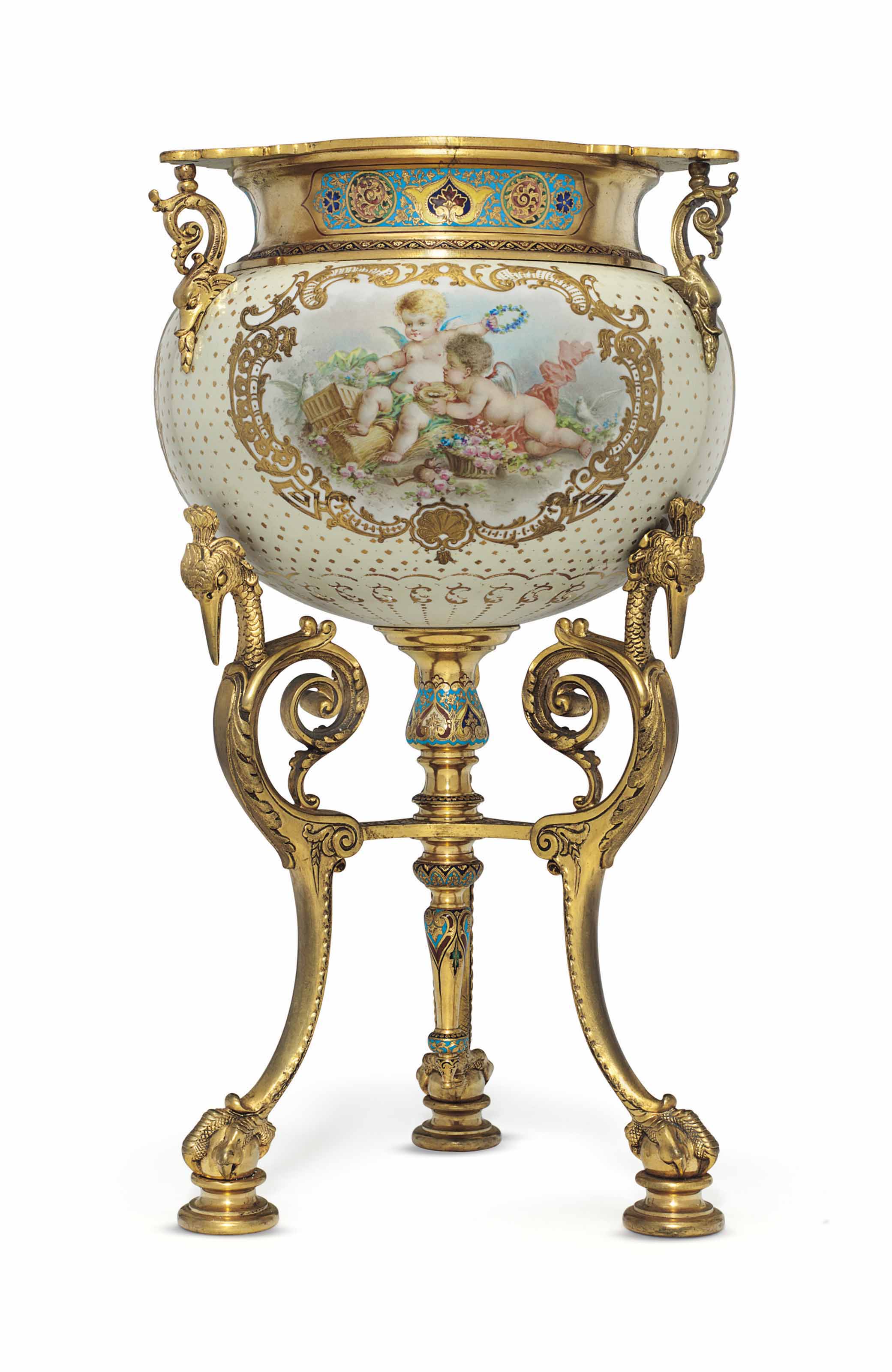 AN ORMOLU AND CHAMPLEVE MOUNTED SEVRES STYLE PORCELAIN BOWL