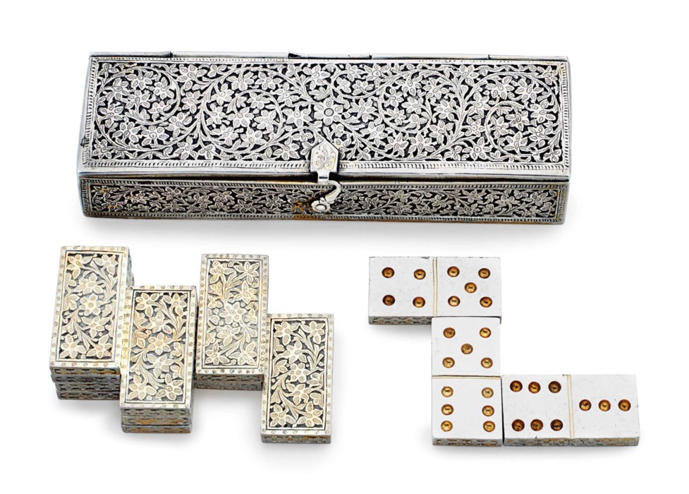 A SET OF PARCEL-GILT SILVERED-METAL DOMINOES, APPARENTLY UNMARKED ...
