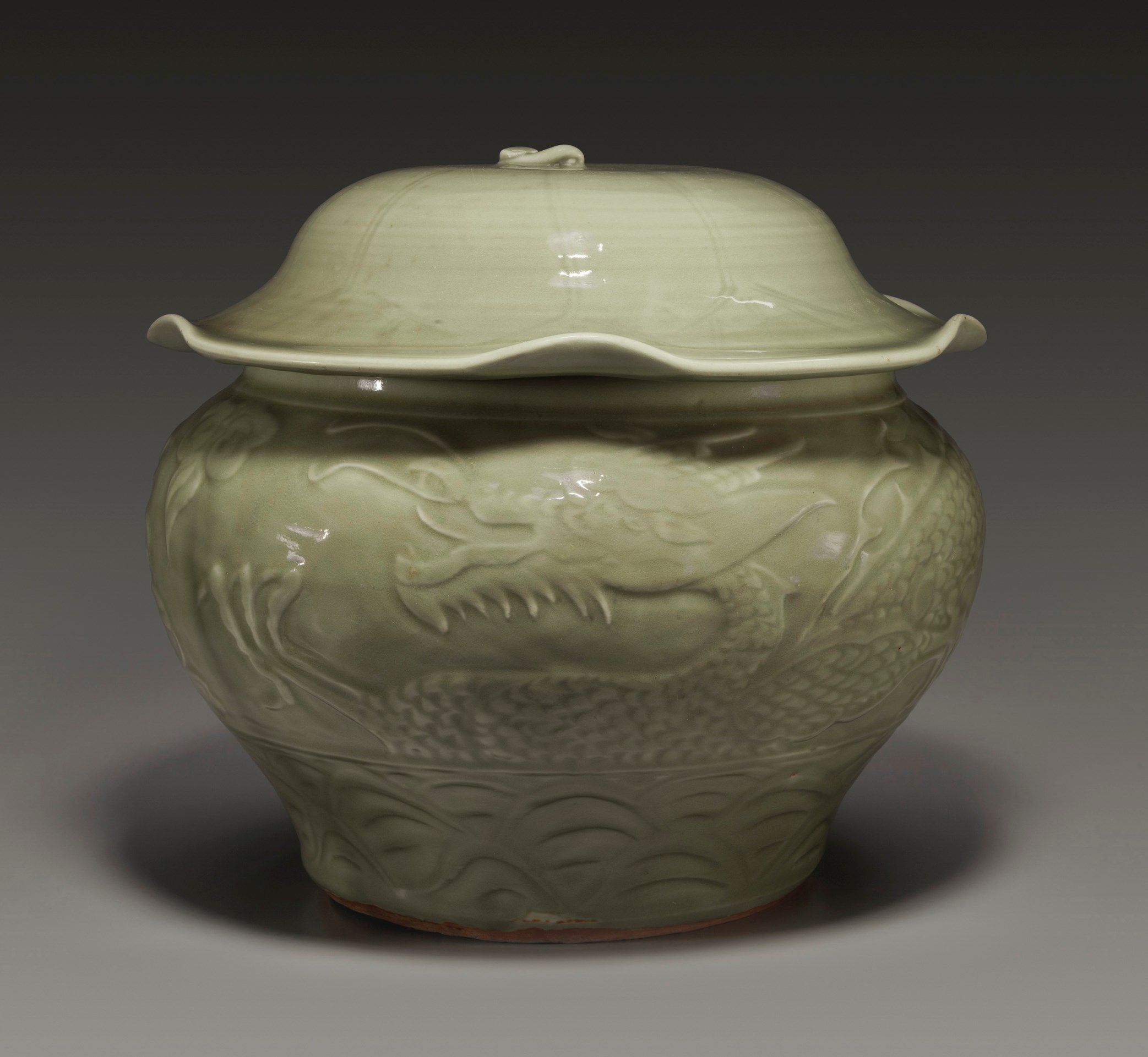A RARE LONGQUAN CELADON CARVED JAR AND COVER, YUAN DYNASTY, 14TH ...