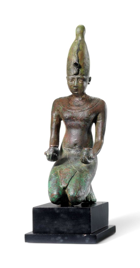AN EGYPTIAN BRONZE KNEELING PHARAOH, LATE PERIOD, 26TH DYNASTY, 664-525 ...