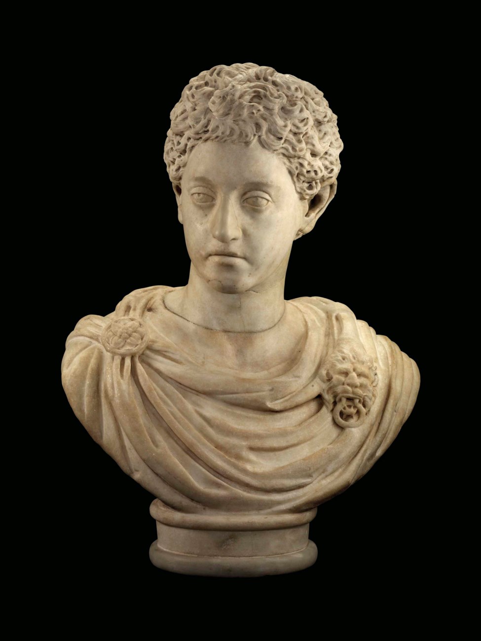 A ROMAN MARBLE PORTRAIT HEAD OF THE YOUNG COMMODUS