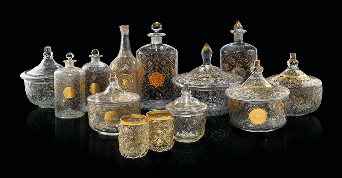 A GROUP OF BEYKOZ GILT AND CUT CLEAR-GLASS BOTTLES, BOWLS AND BEAKERS ...