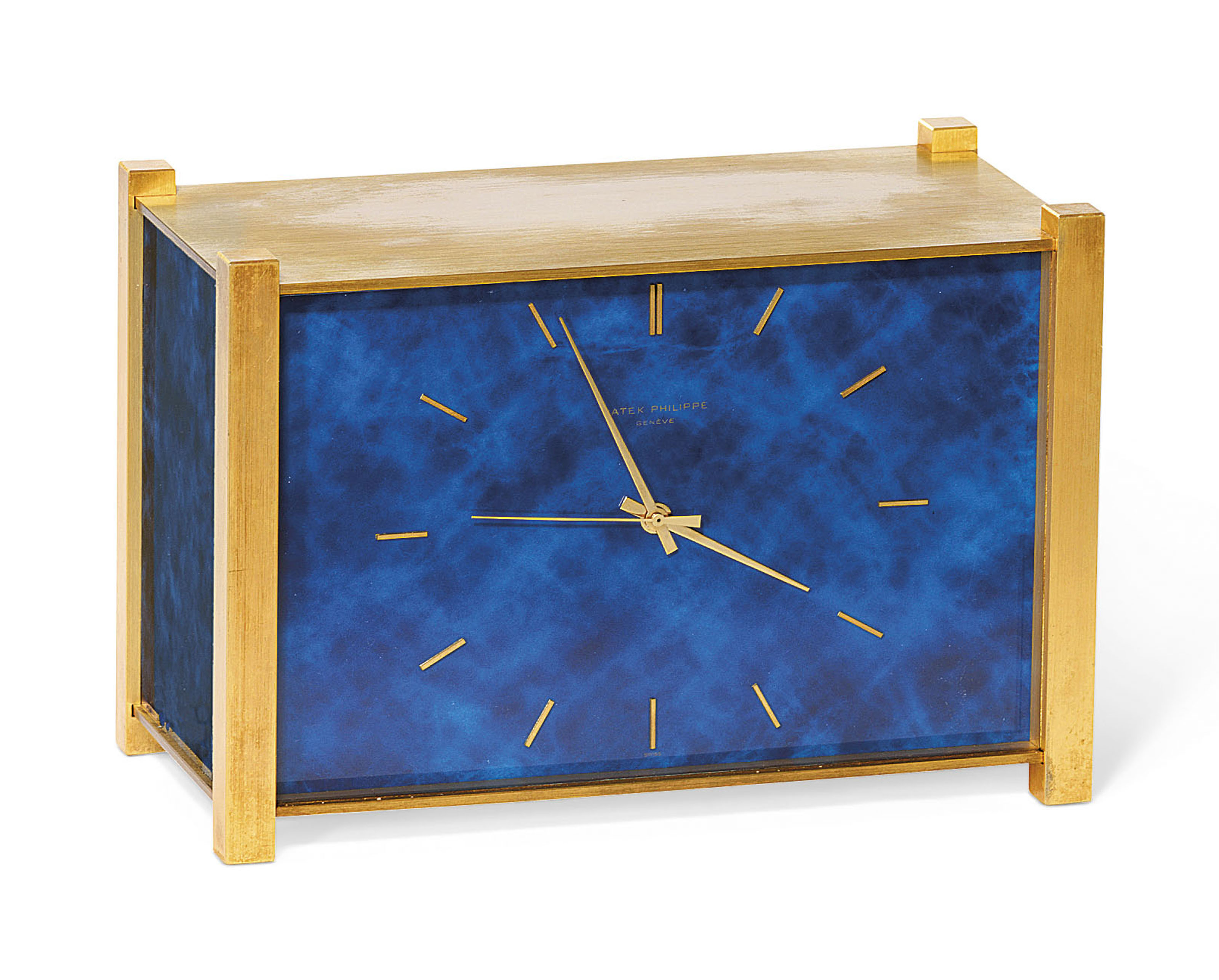 AN UNUSUAL GILT-BRASS AND DARK BLUE LACQUERED ELECTRONIC QUARTZ DESK CLOCK