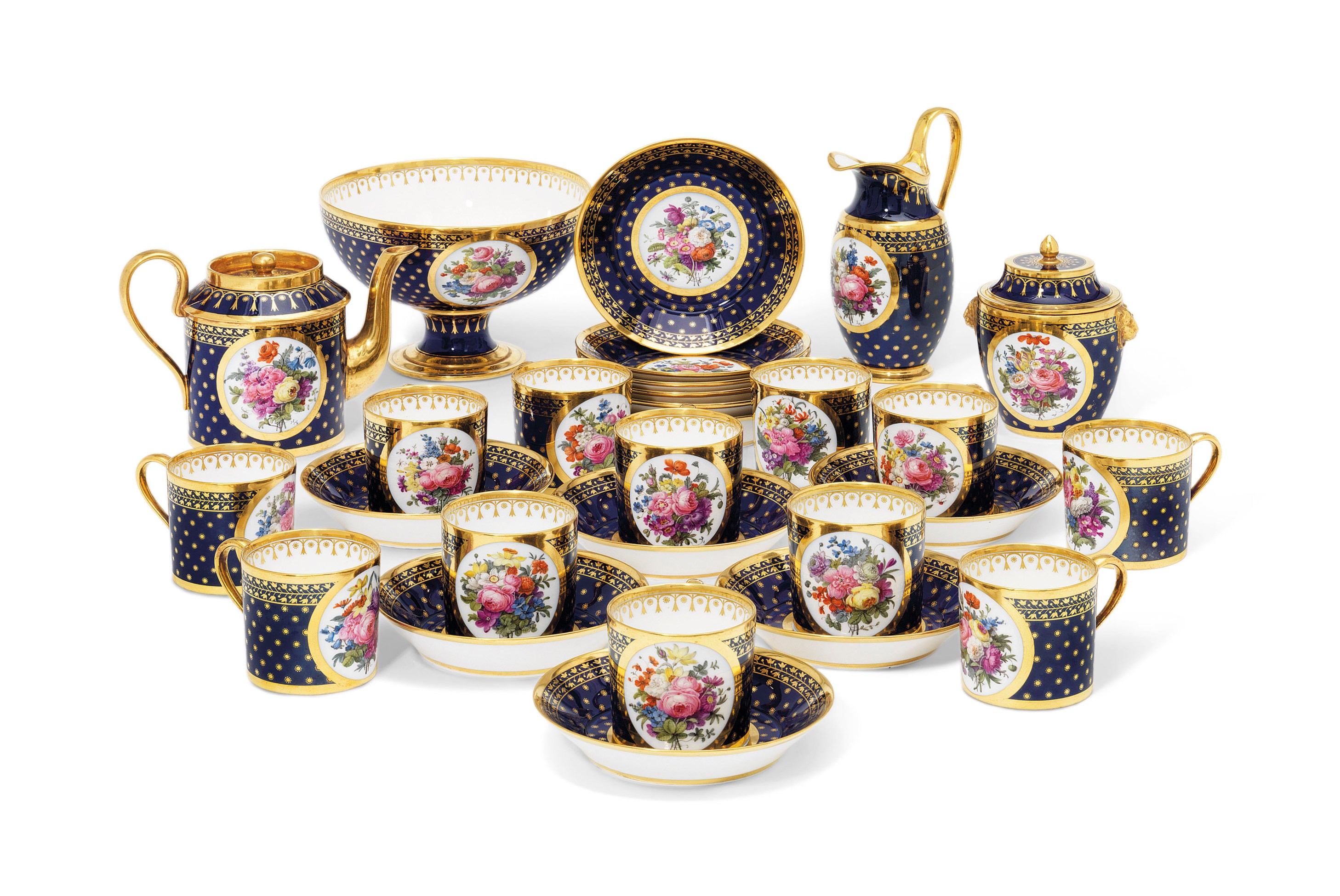 A SEVRES (HARD PASTE) PORCELAIN DARK BLUE-GROUND TEA-SERVICE