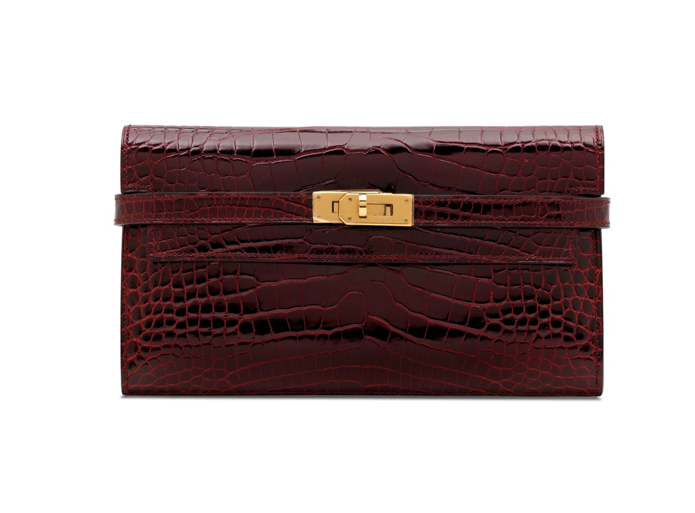 A SHINY BORDEAUX ALLIGATOR KELLY WALLET WITH GOLD HARDWARE, HERMÈS ...