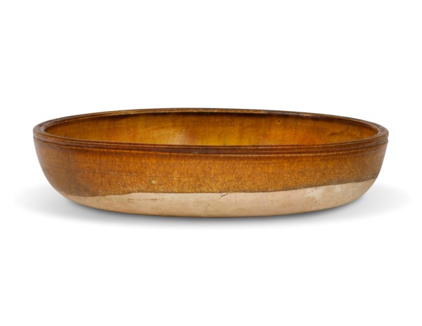 A BLUE, AMBER AND CREAM-GLAZED POTTERY DISH, LIAO DYNASTY (907-1125 AD ...