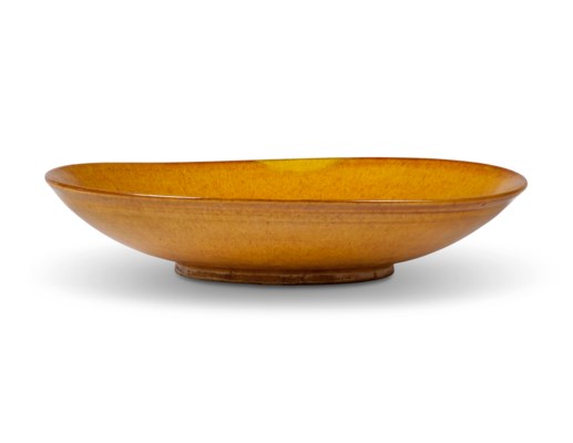 A LARGE AMBER-GLAZED DISH, LIAO DYNASTY (907-1125 AD) | Christie’s