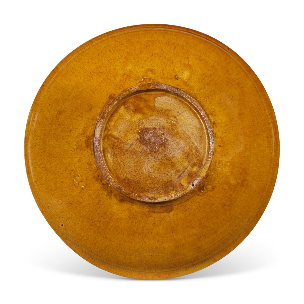 A LARGE AMBER-GLAZED DISH, LIAO DYNASTY (907-1125 AD) | Christie’s