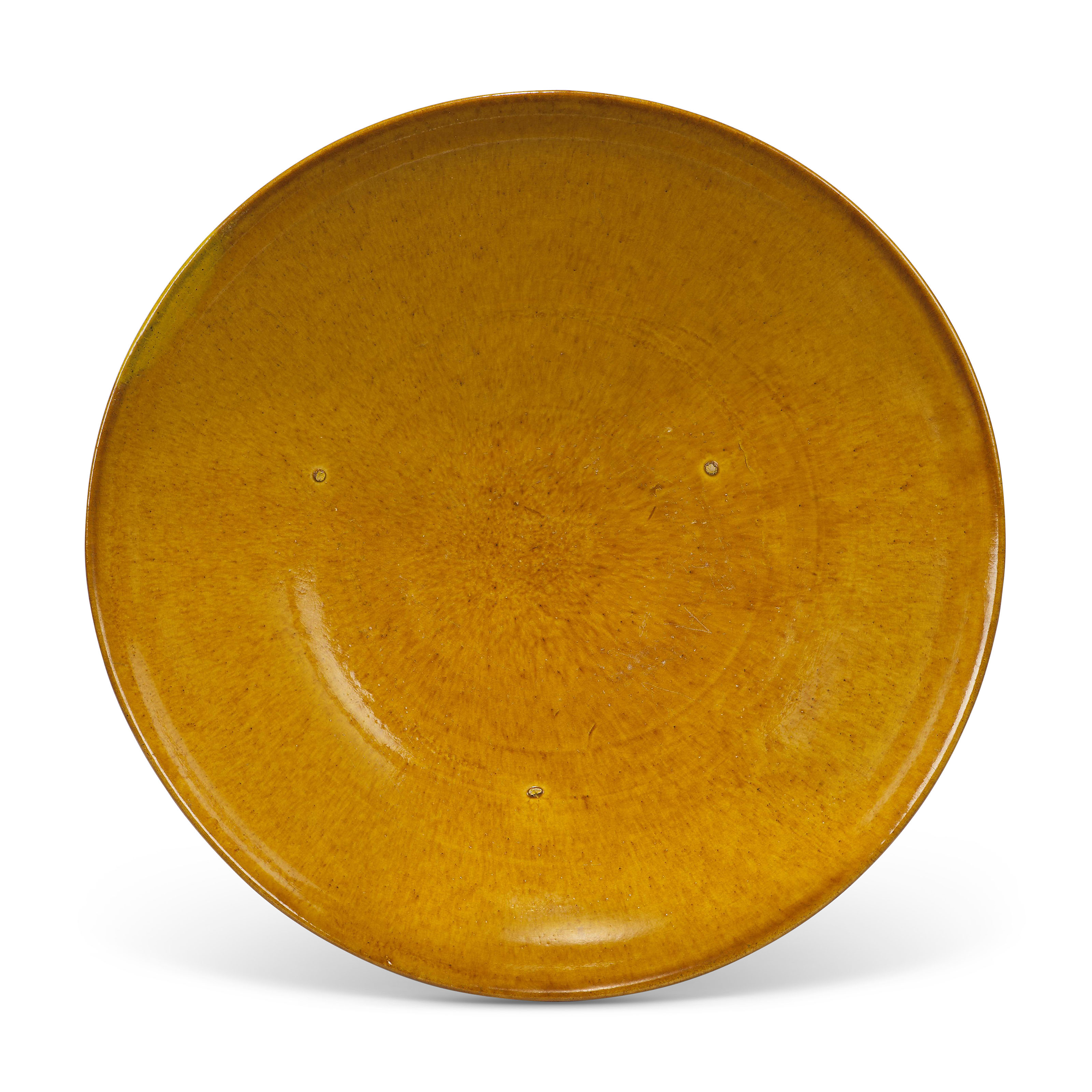 A LARGE AMBER-GLAZED DISH, LIAO DYNASTY (907-1125 AD) | Christie’s