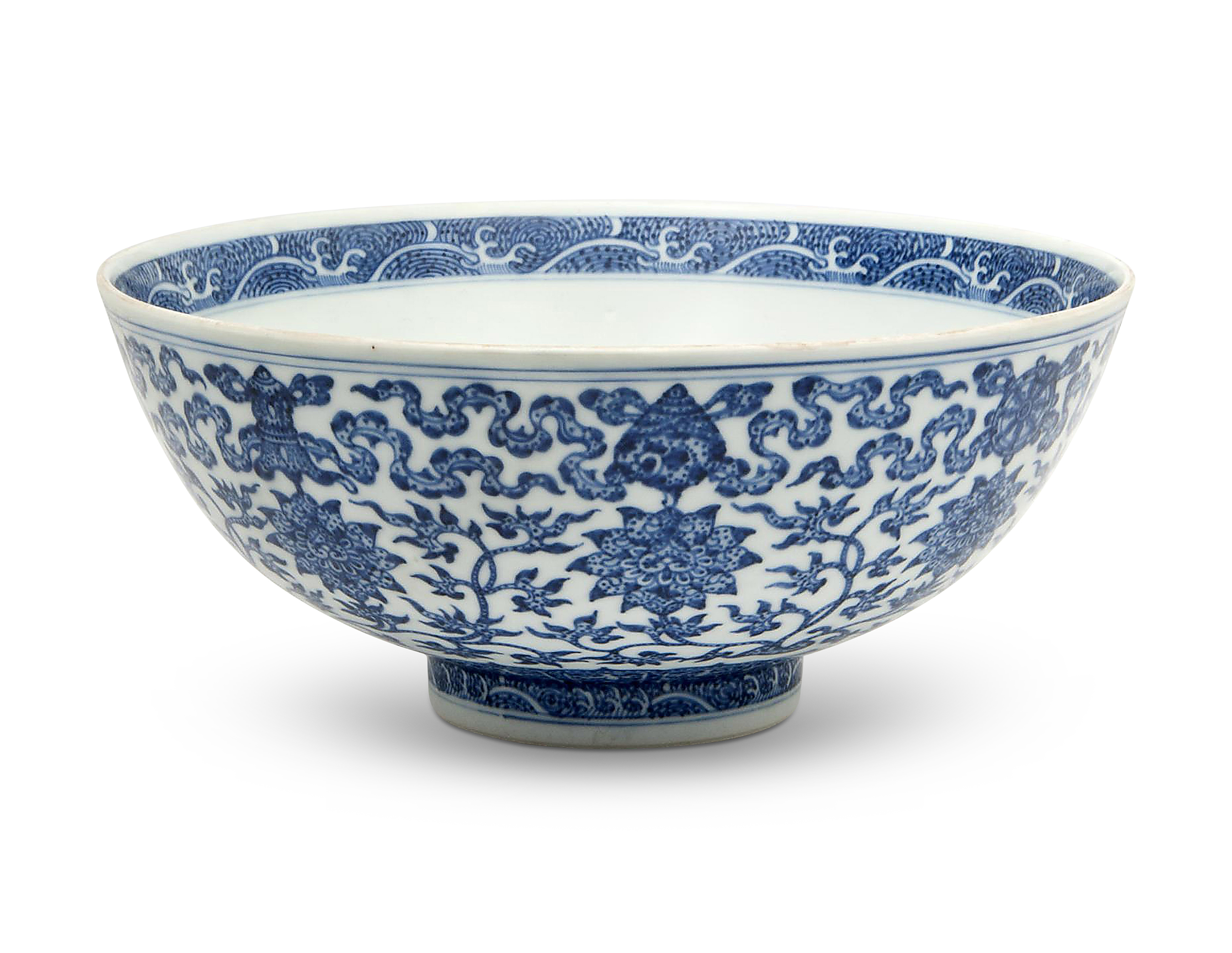 A LARGE MING-STYLE BLUE AND WHITE 'LOTUS AND BAJIXIANG' BOWL, QIANLONG ...