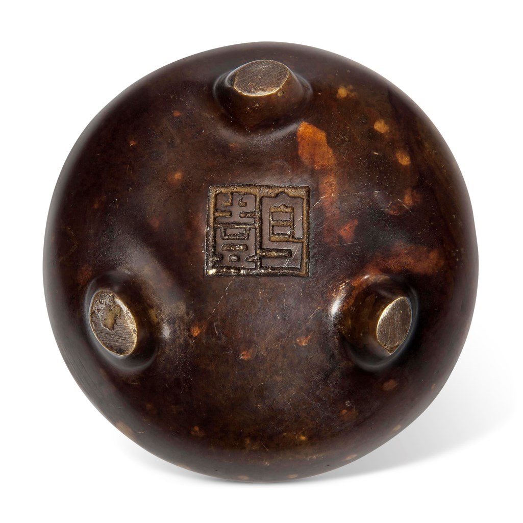 A SMALL GOLD-SPLASHED BRONZE TRIPOD CENSER, 19TH CENTURY | Christie’s