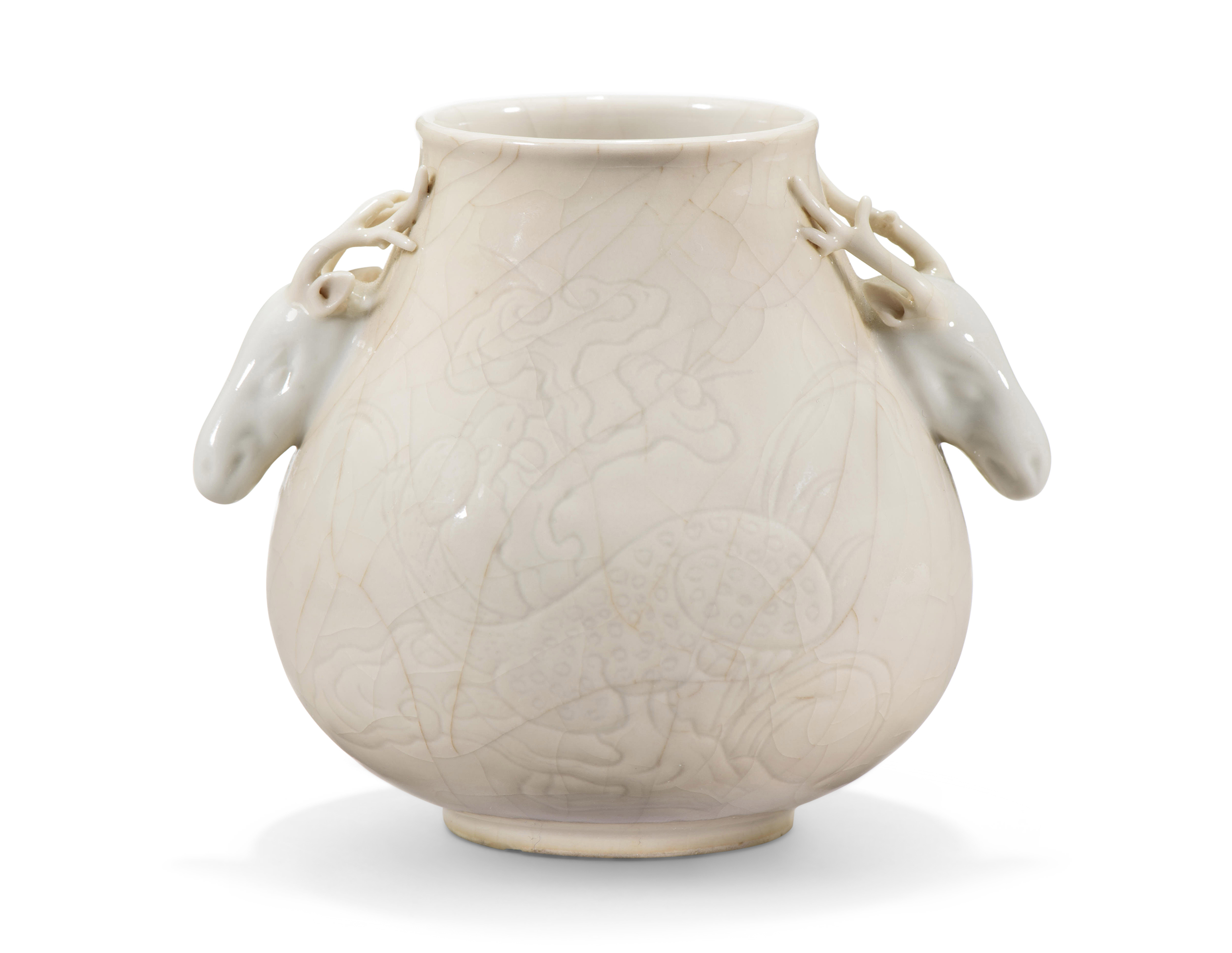 A SMALL INCISED WHITE-GLAZED `DEER' VASE, HU, 17TH-18TH CENTURY ...