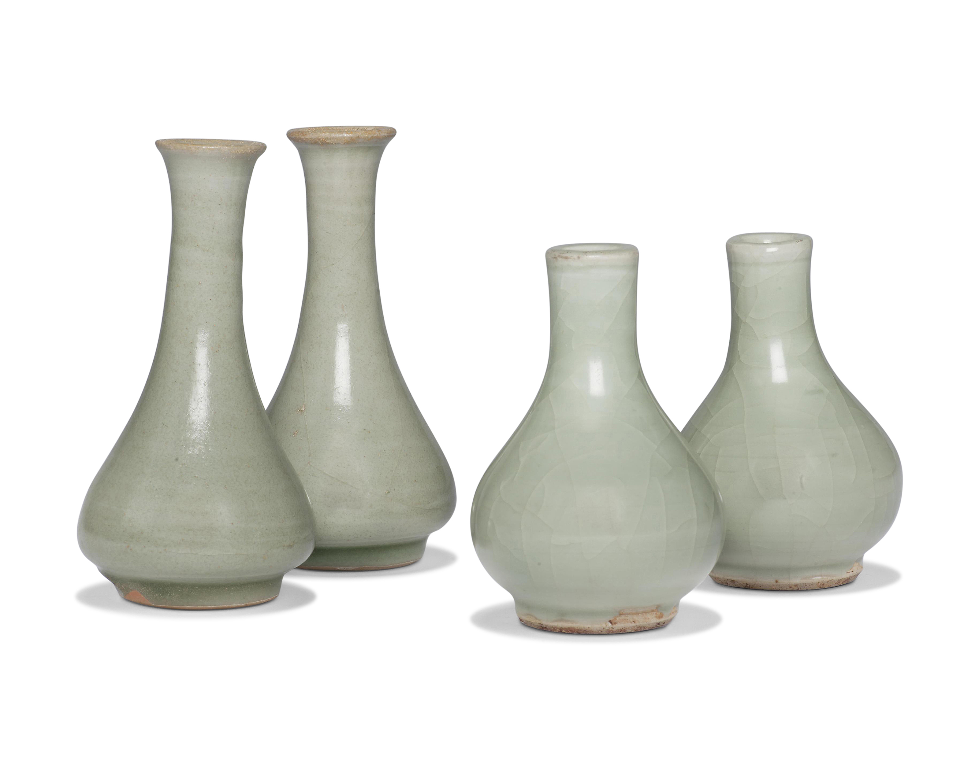 A PAIR OF LONGQUAN CELADON-GLAZED VASES AND A LARGER PAIR OF CELADON ...