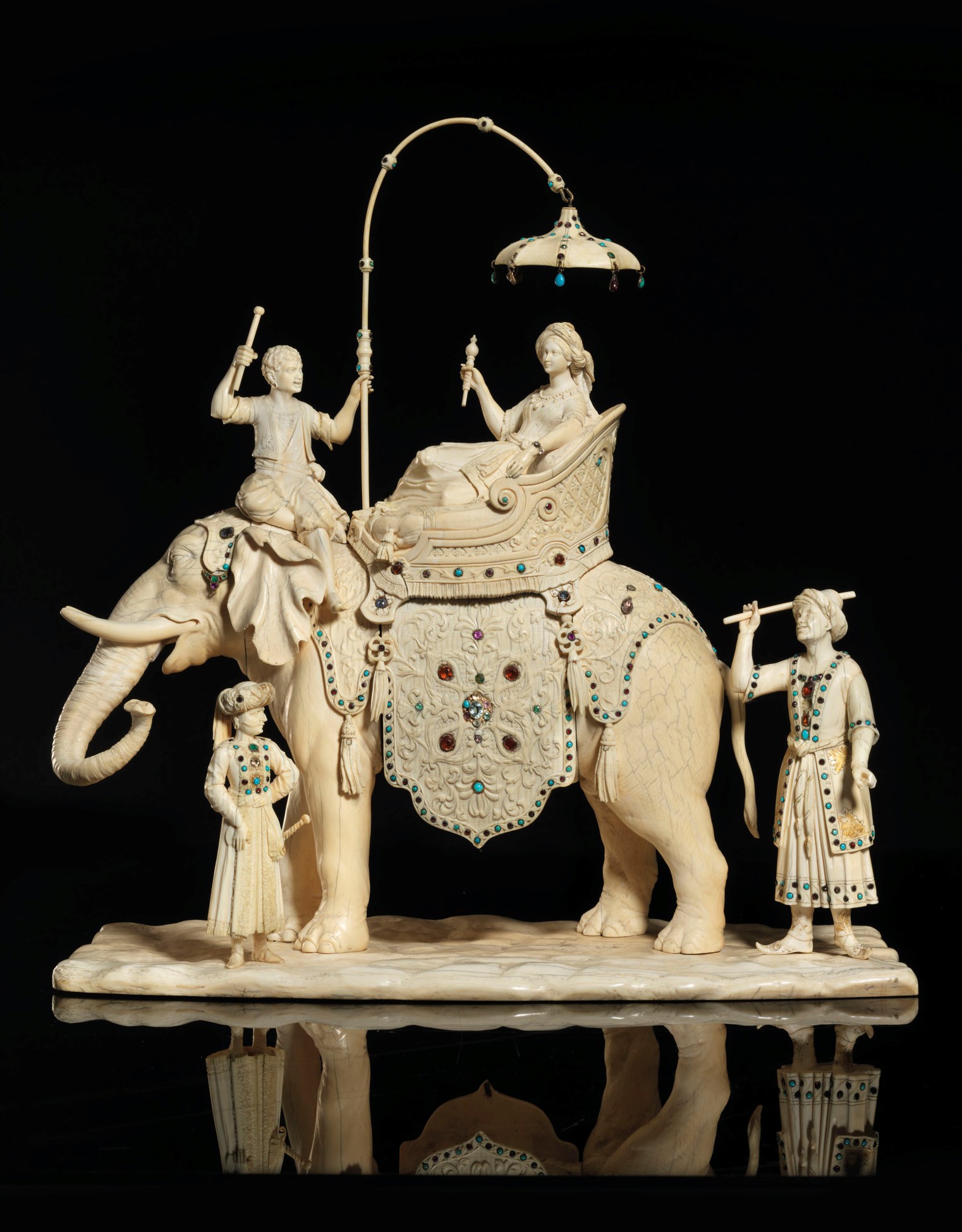 AN AUSTRIAN IVORY AND 'JEWEL'-MOUNTED MODEL OF AN ELEPHANT HOWDAH ...