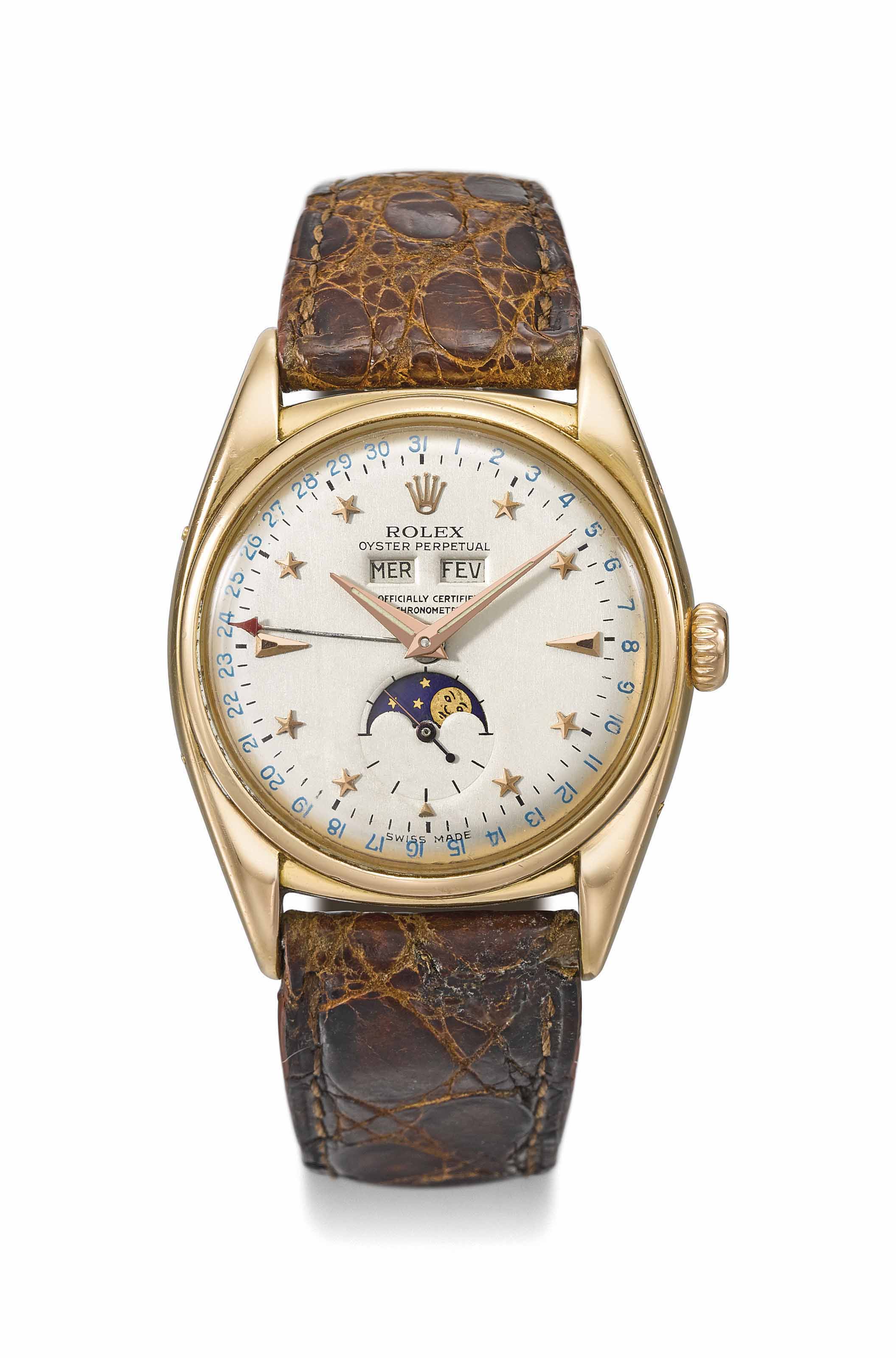 Rolex. A very rare and important 18K pink gold automatic triple ...