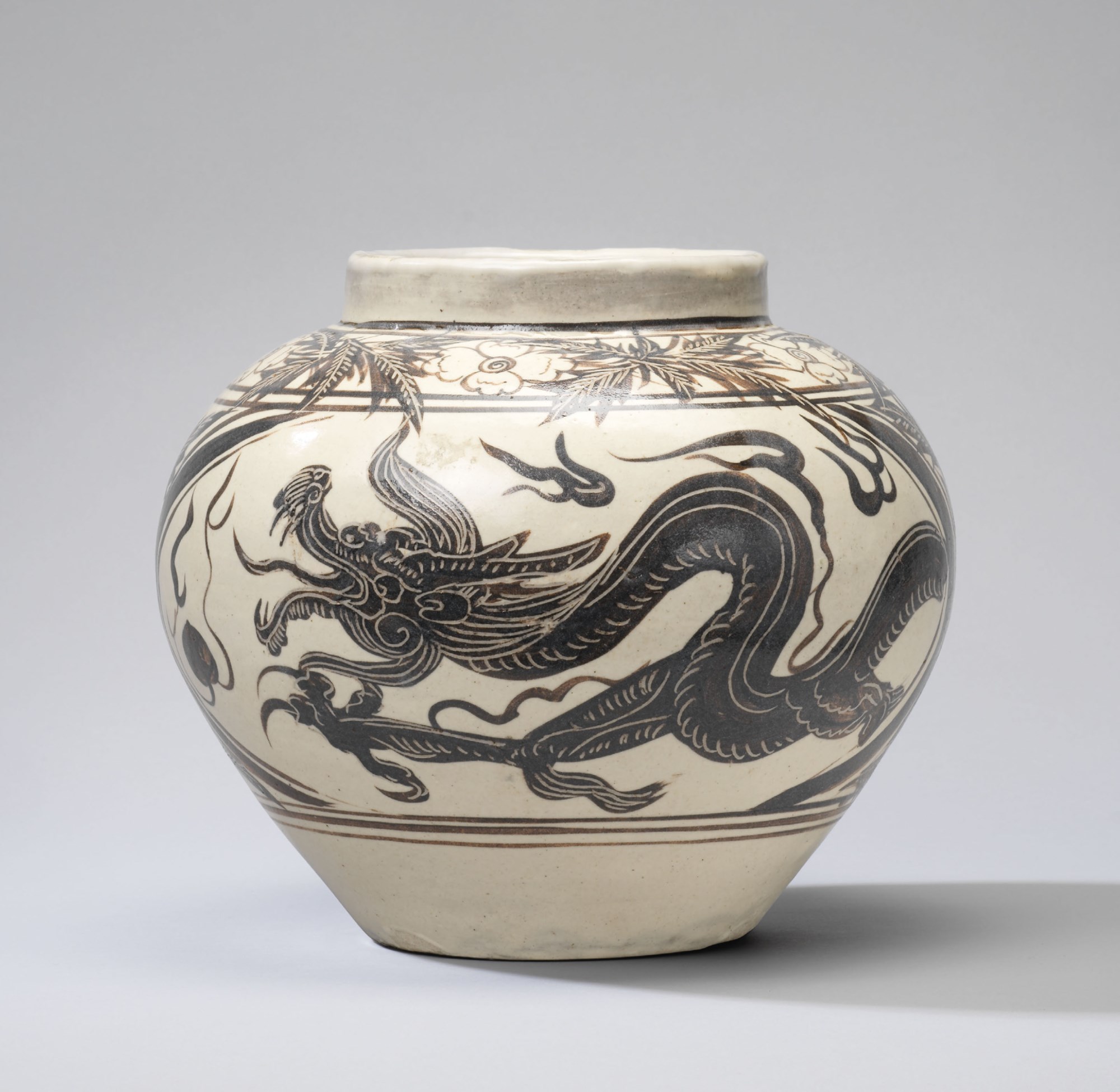A RARE CIZHOU 'DRAGON' JAR, YUAN DYNASTY (1279-1368) | Christie's