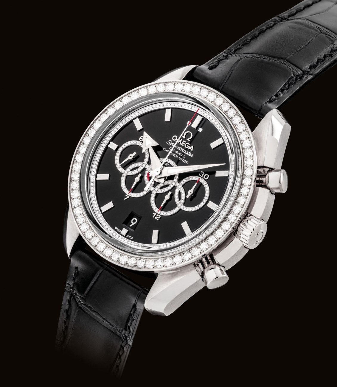 OMEGA. A FINE AND ATTRACTIVE 18K WHITE GOLD AND DIAMOND-SET AUTOMATIC 5 ...