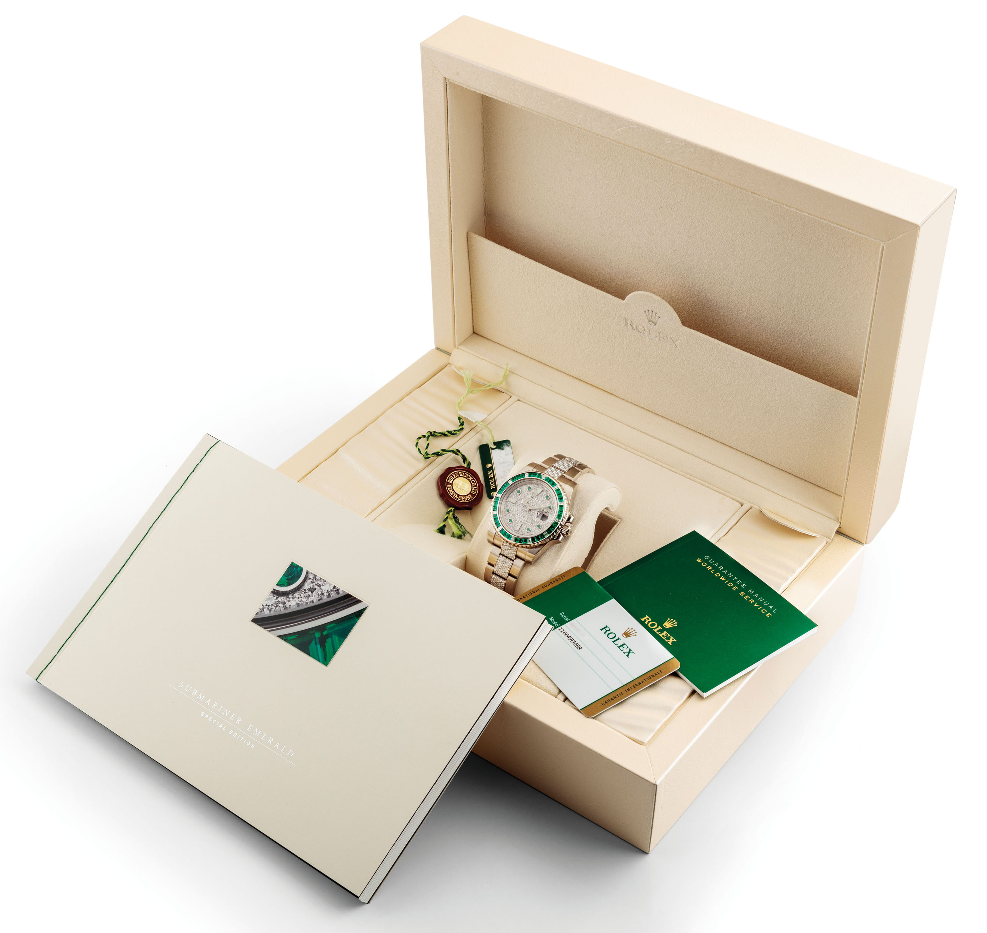 ROLEX. AN EXTREMELY RARE AND HIGHLY ATTRACTIVE 18K WHITE GOLD, EMERALD ...