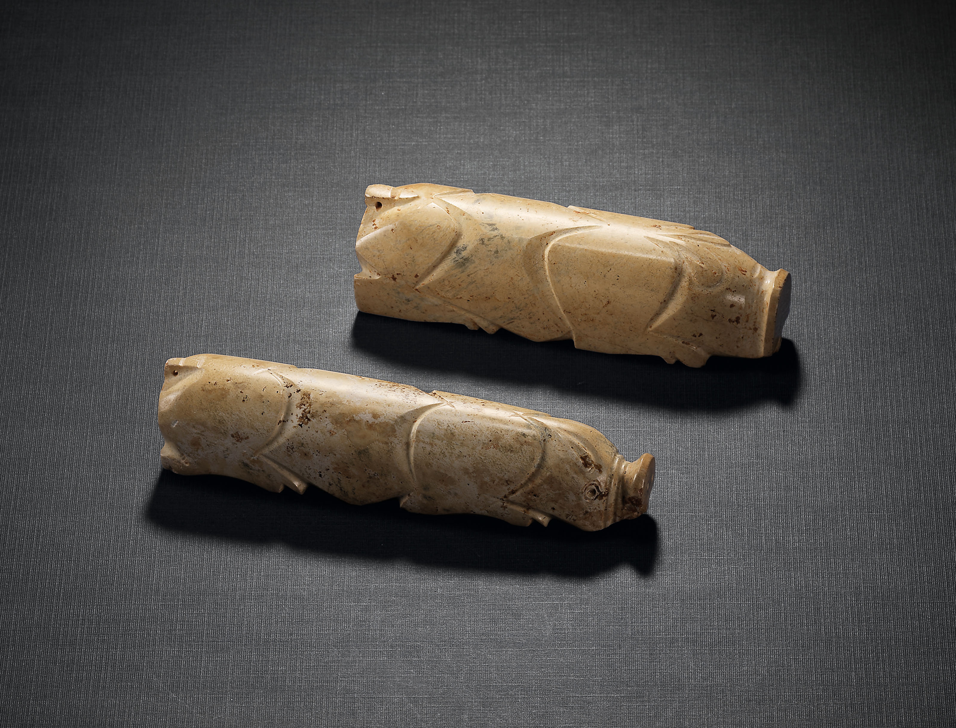 AN EXCEPTIONALLY RARE AND LARGE WHITE JADE 'TIGER' DISC, BI, EASTERN ...