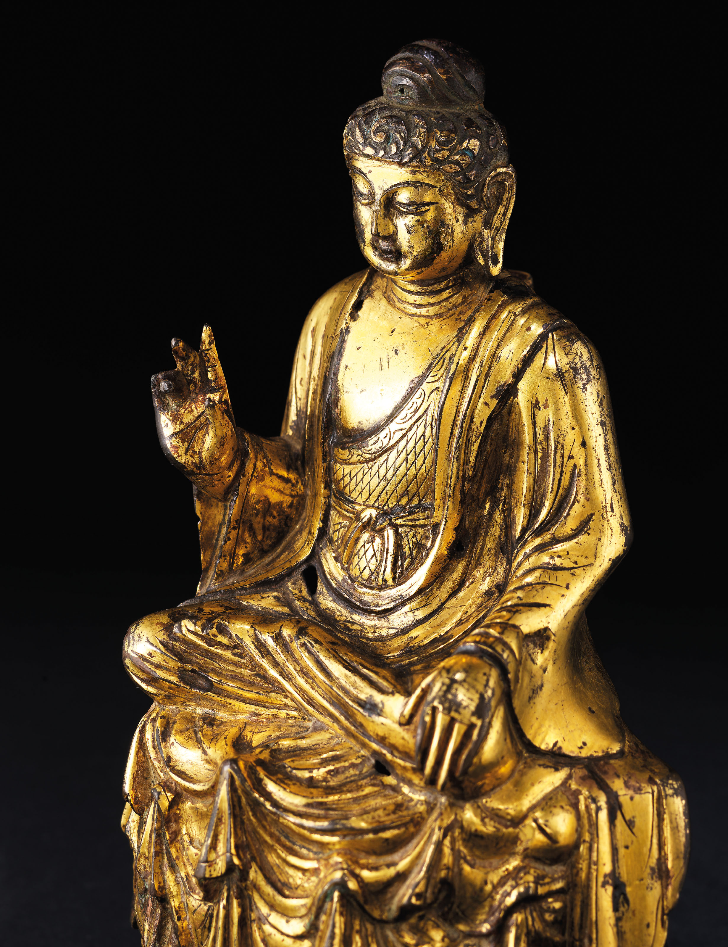 A RARE GILT-BRONZE FIGURE OF BUDDHA