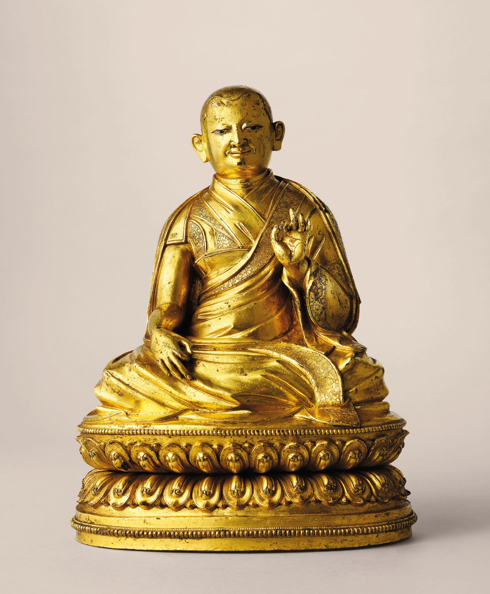 A RARE INSCRIBED GILT-BRONZE FIGURE OF THE THIRD DALAI LAMA, SONAM ...
