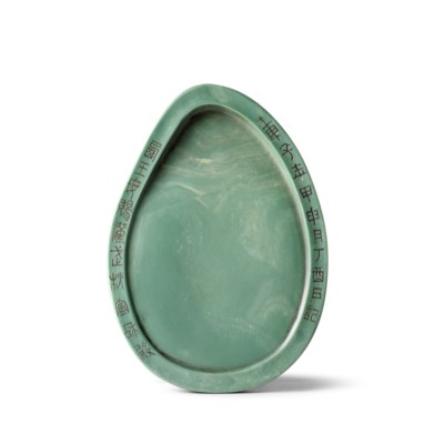 A SONGHUA INKSTONE AND PEACH-SHAPED CINNABAR LACQUER BOX, QING DYNASTY ...