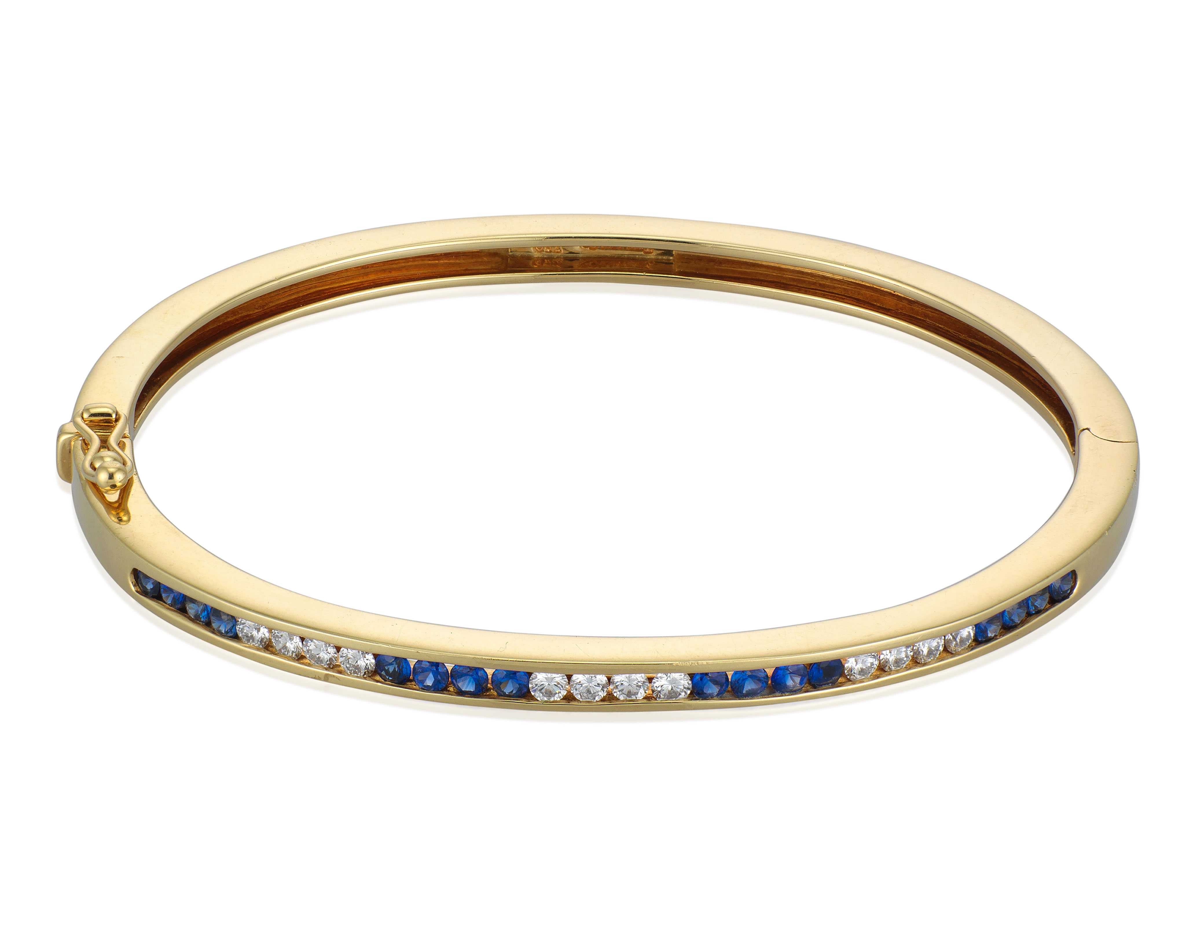 TIFFANY & CO. SAPPHIRE AND DIAMOND BANGLE, | Christie’s