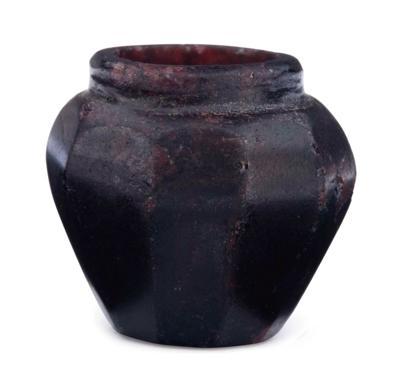 A ROMAN GARNET VESSEL, CIRCA 1ST CENTURY B.C.-1ST CENTURY A.D. | Christie's