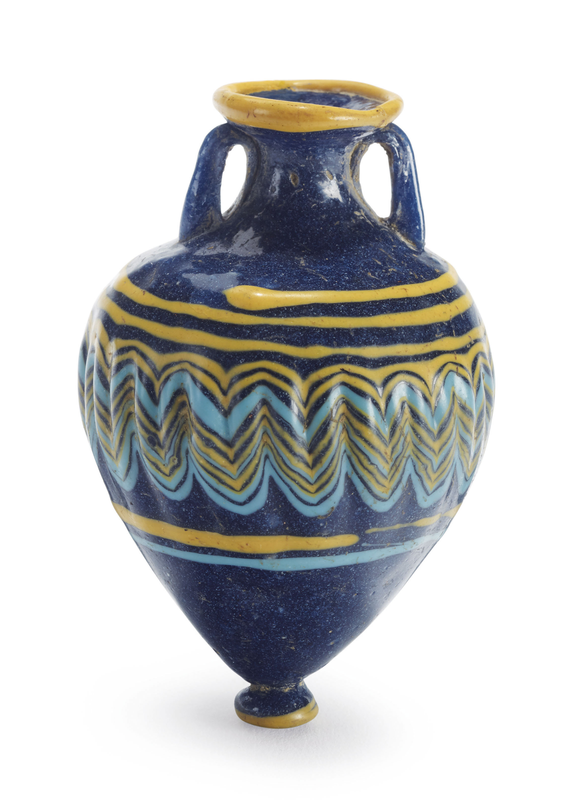 THREE CARTHAGINIAN GLASS HEAD BEADS, CIRCA 6TH-MID 2ND CENTURY B.C ...