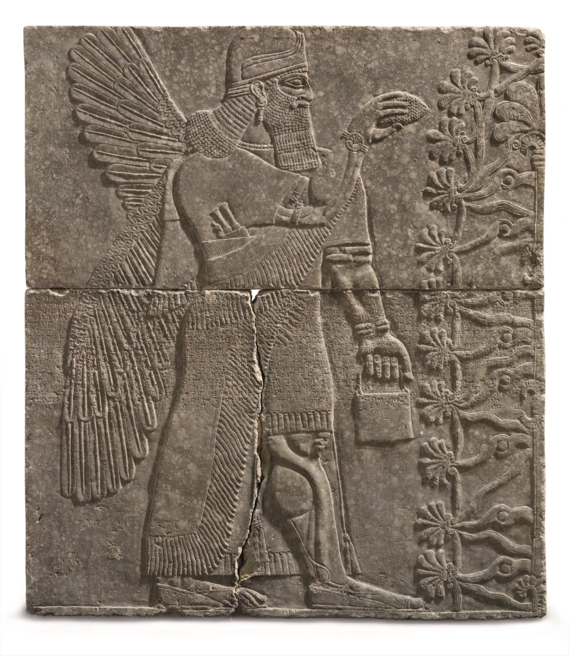 AN ASSYRIAN GYPSUM RELIEF OF A WINGED GENIUS, REIGN OF ASHURNASIRPAL II ...