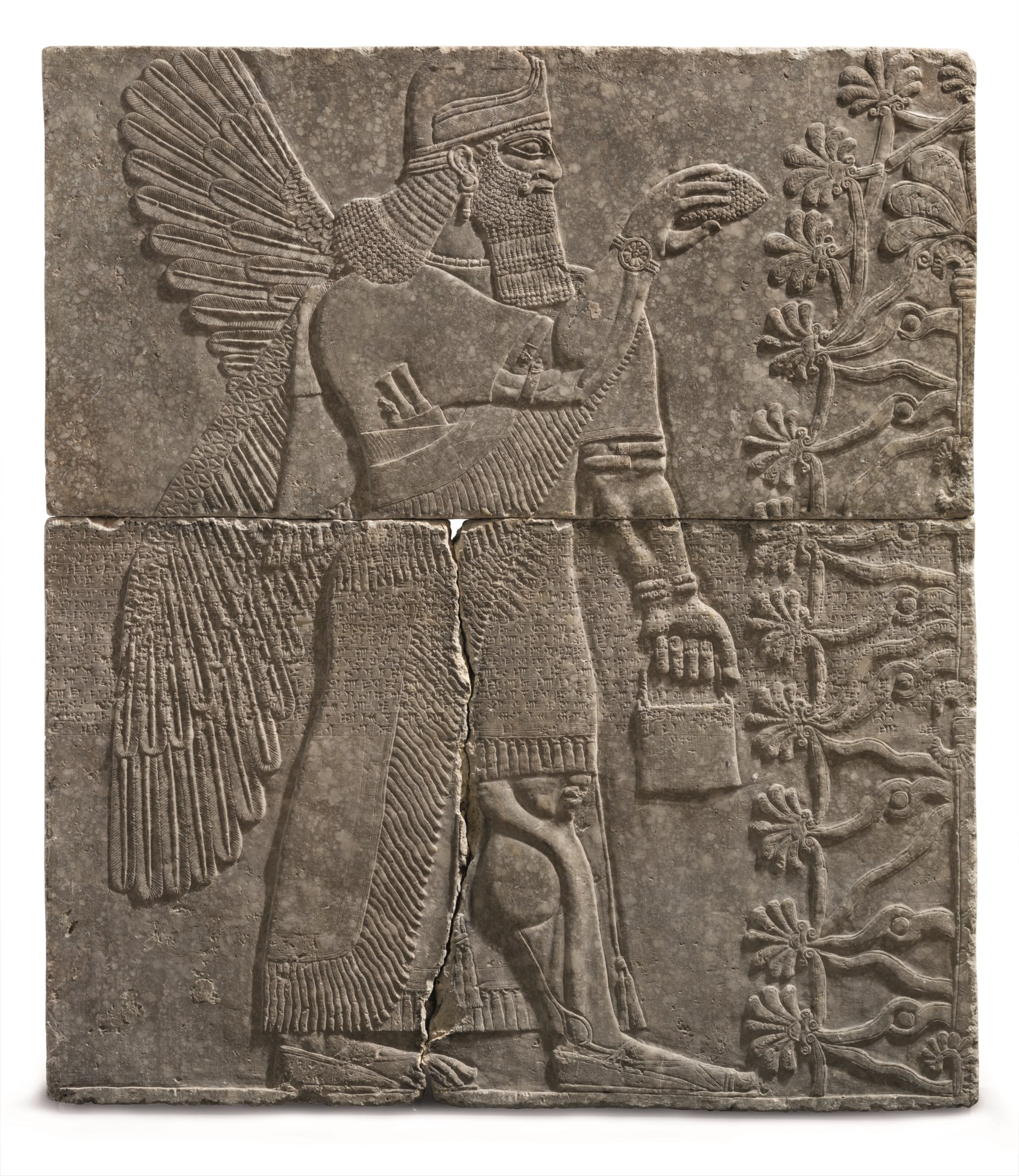 AN ASSYRIAN GYPSUM RELIEF OF A WINGED GENIUS, REIGN OF ASHURNASIRPAL II ...