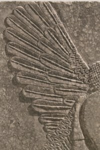 AN ASSYRIAN GYPSUM RELIEF OF A WINGED GENIUS, REIGN OF ASHURNASIRPAL II ...