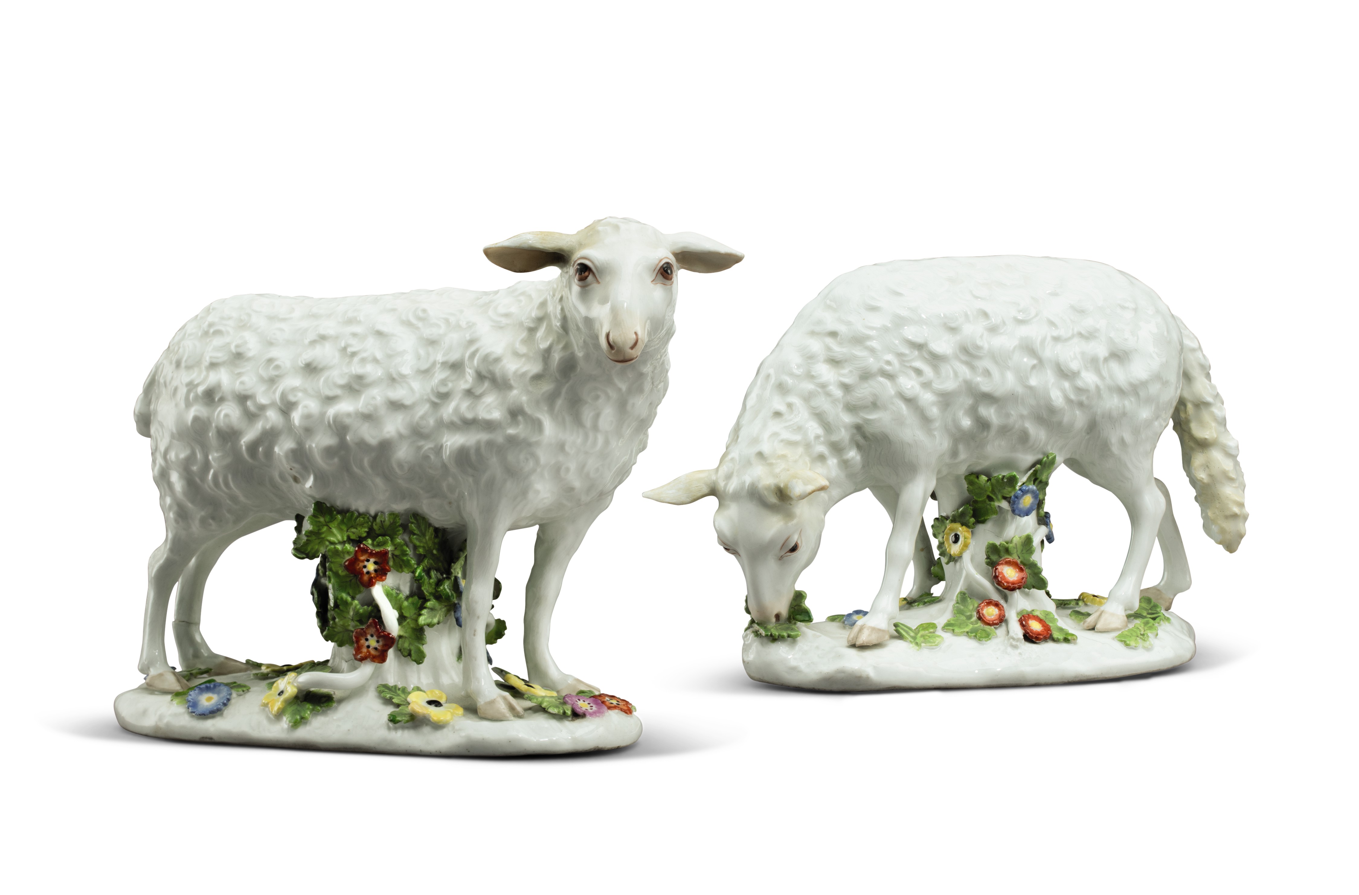 A PAIR OF MEISSEN PORCELAIN MODELS OF SHEEP, CIRCA 1760, MODELED BY J.J ...