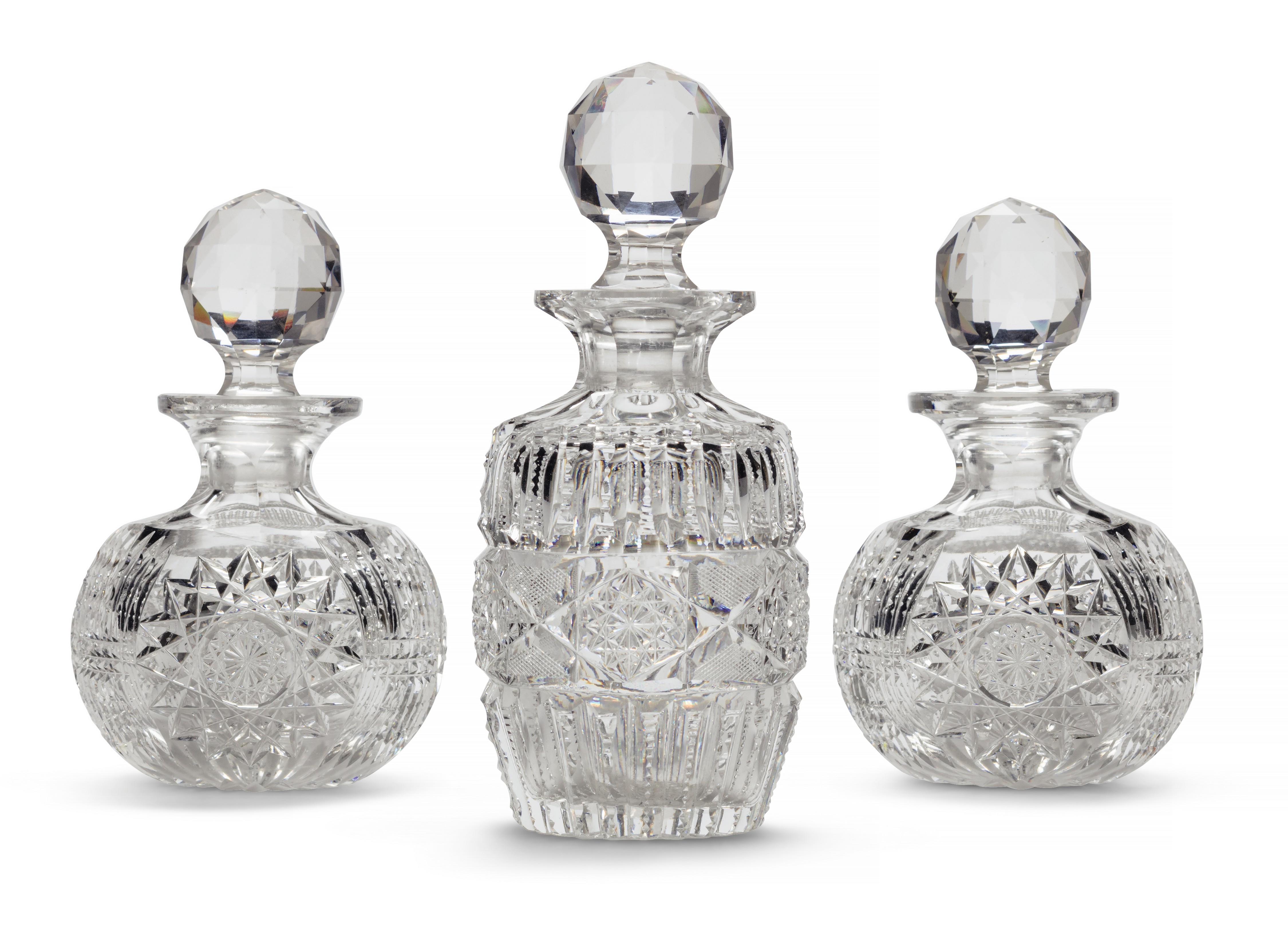 A PAIR OF COLORLESS CUT-GLASS DECANTERS, PROBABLY AMERICAN, 19TH/20TH ...